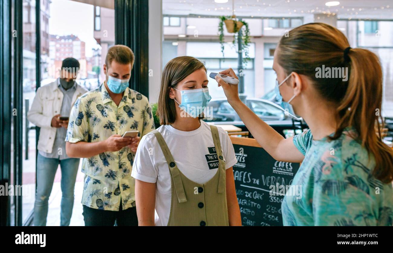 Checking the line hi-res stock photography and images - Alamy