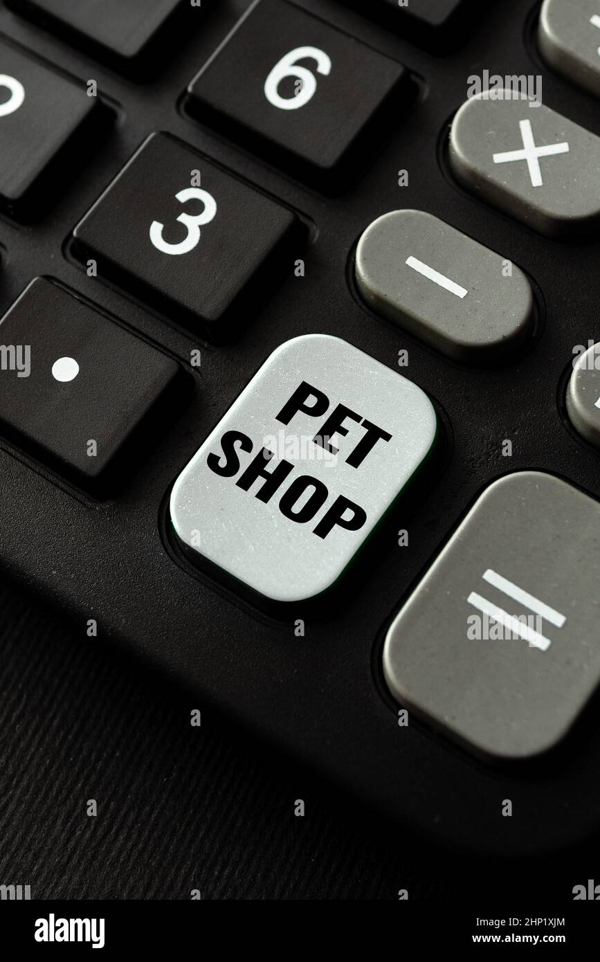 Sign displaying Pet Shop, Word for Retail business that sells different ...