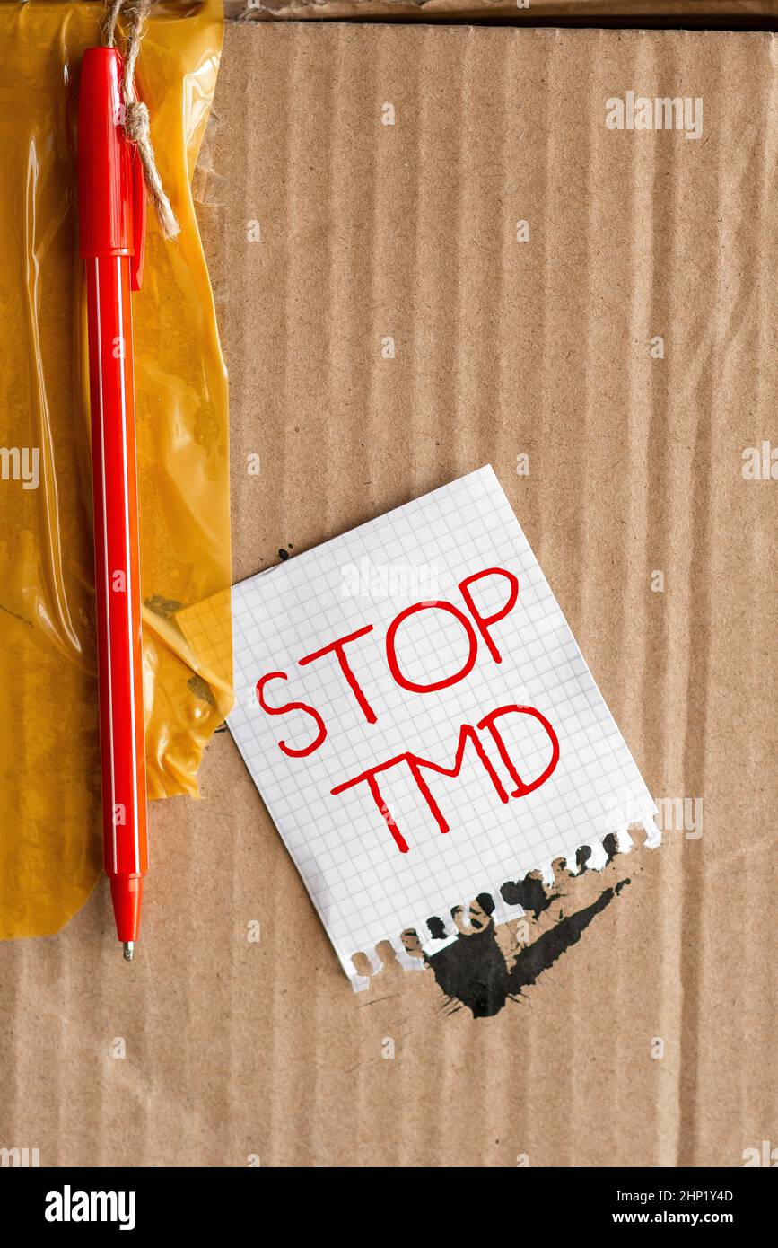 Sign displaying Stop Tmd, Concept meaning Prevent the disorder or ...