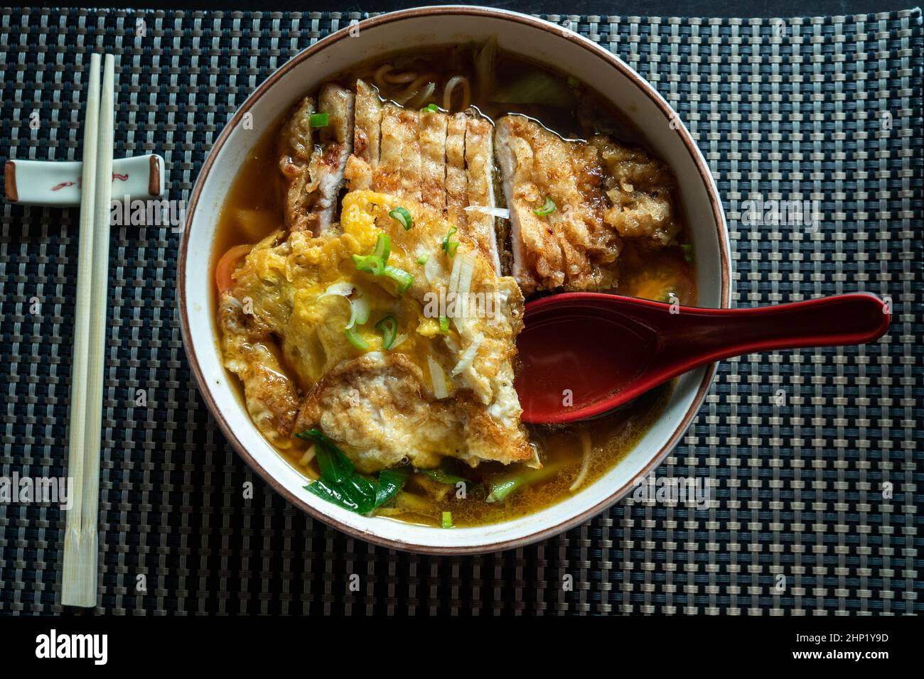 Concept: Asian healthy food. Ramen bowl on the table in a Japanese ...