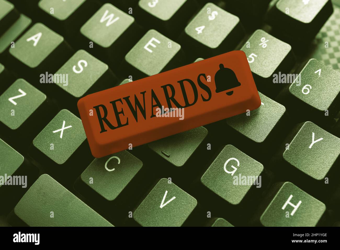 Hand writing sign Rewards, Concept meaning Given in recognition of ...