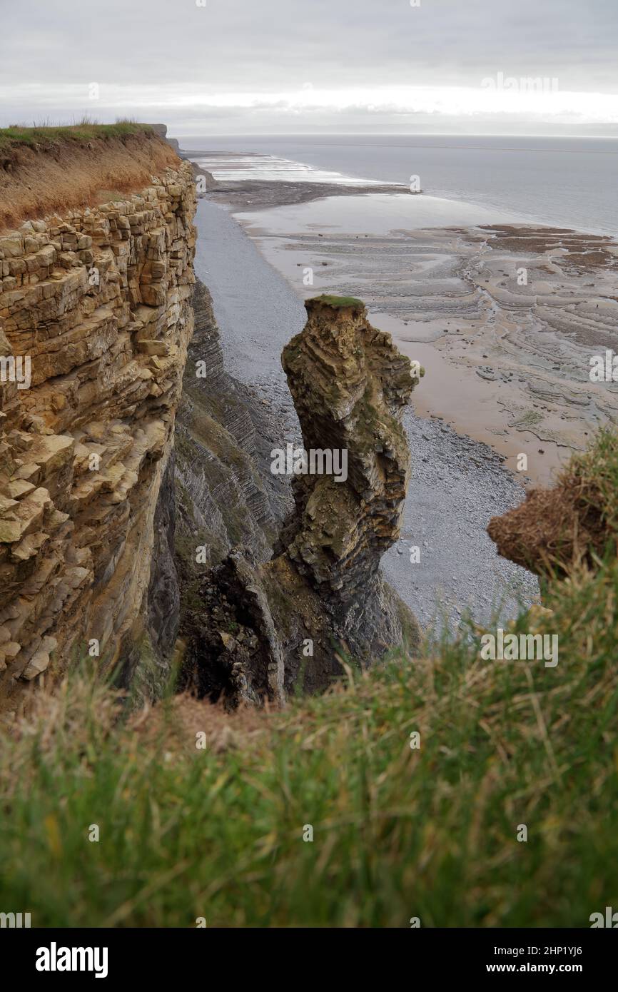 A huge broken rock pillar left stranded on the cliff side just waiting ...