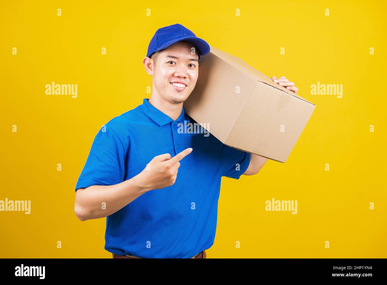 Portrait excited delivery happy man logistic standing he smile wearing ...
