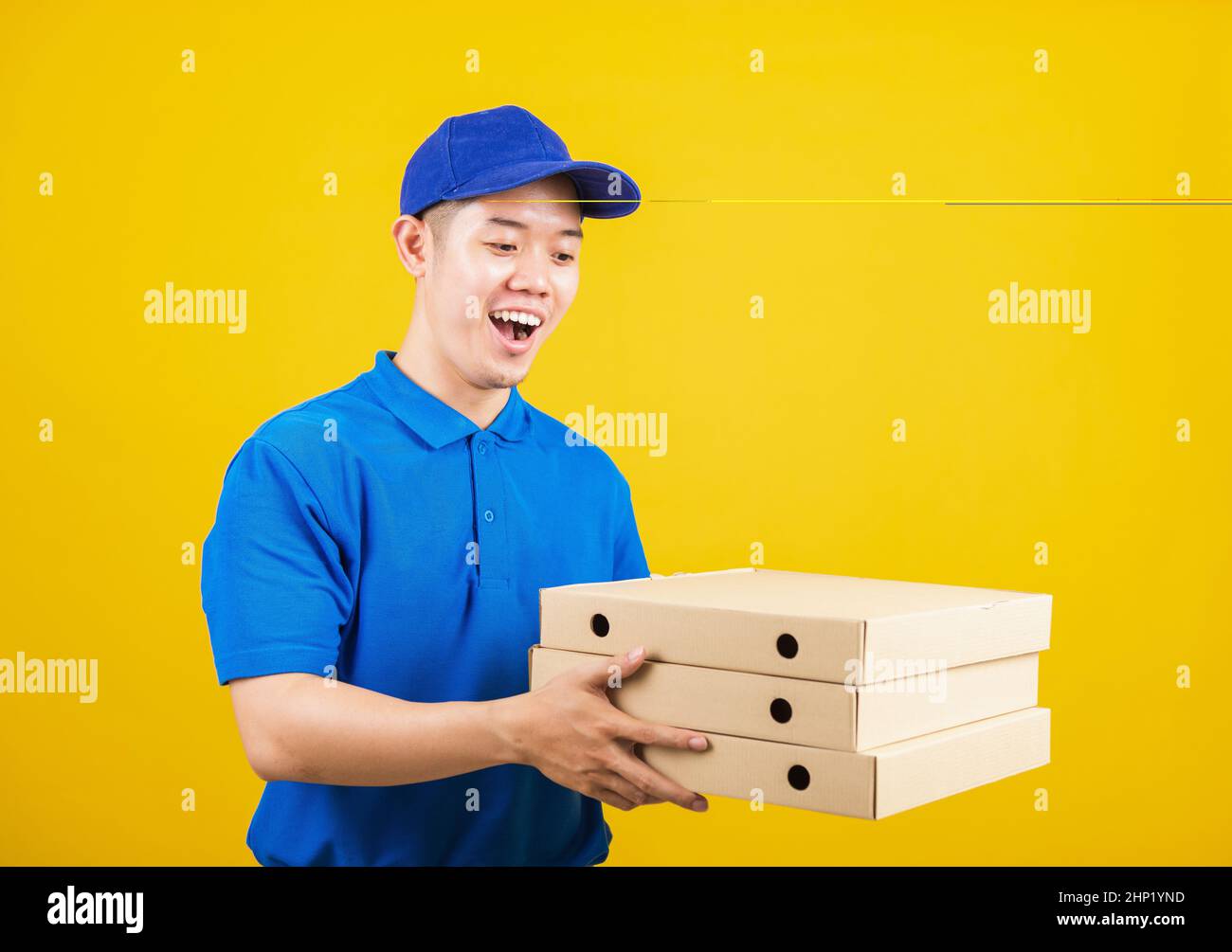 Portrait excited delivery service man standing he smile wearing blue t ...