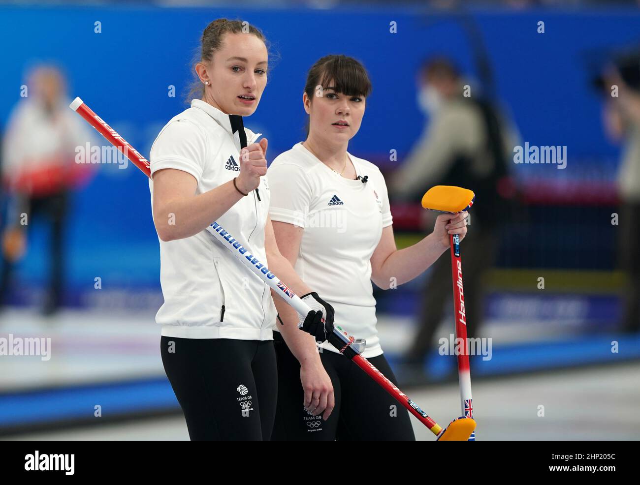 Great Britain's Jennifer Dodds (left) and Hailey Duff in the first end ...