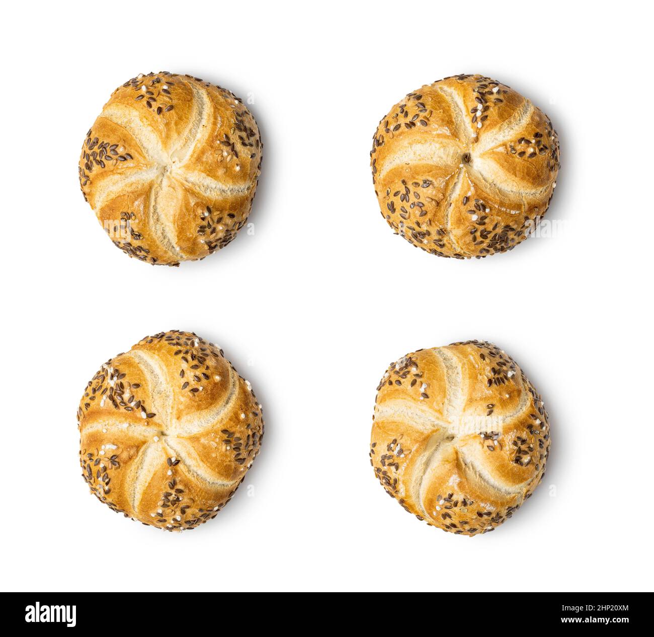 Four baked french buns with seeds isolated on white background Stock ...