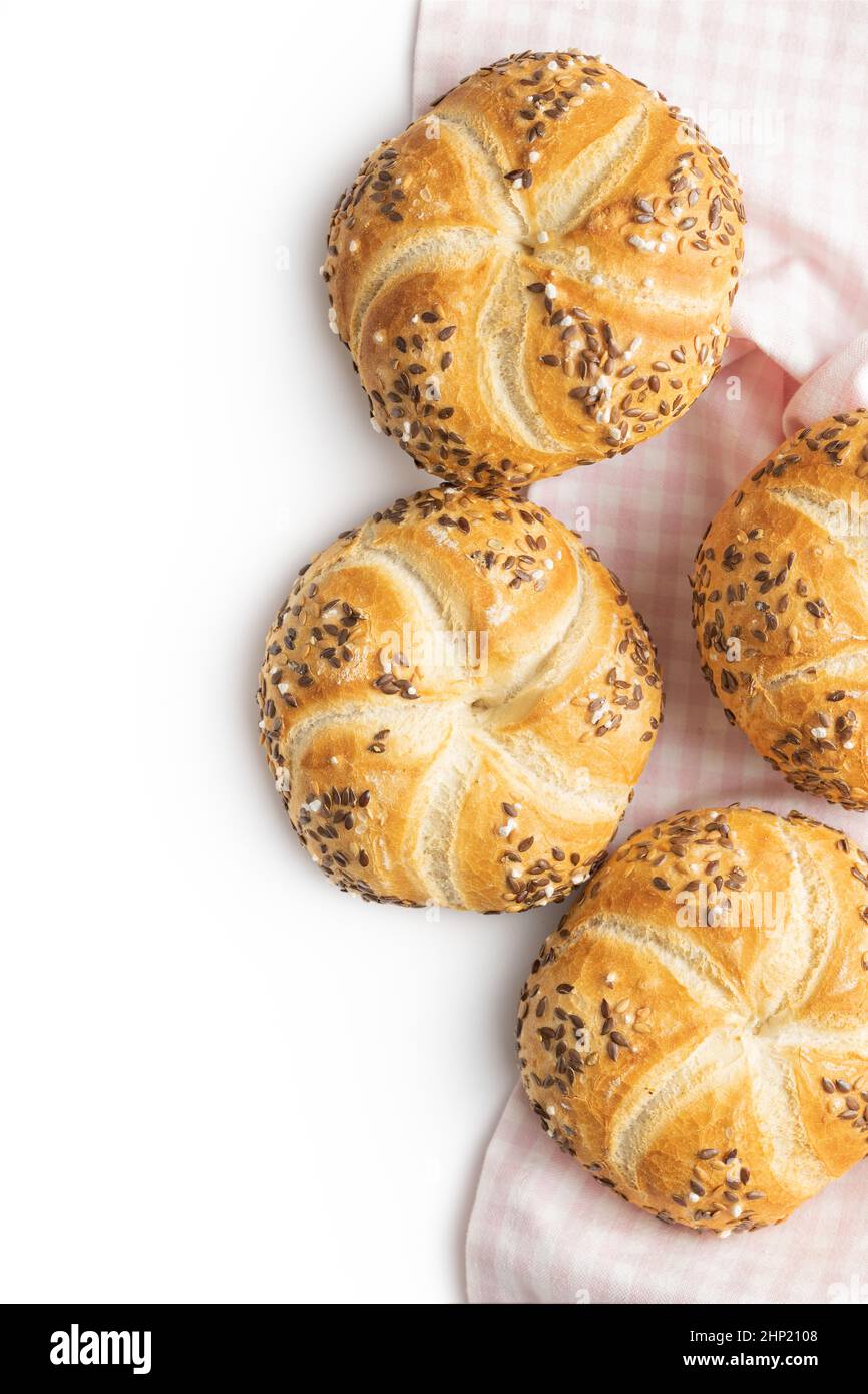 Baked french bun with seeds isolated on white background Stock Photo ...