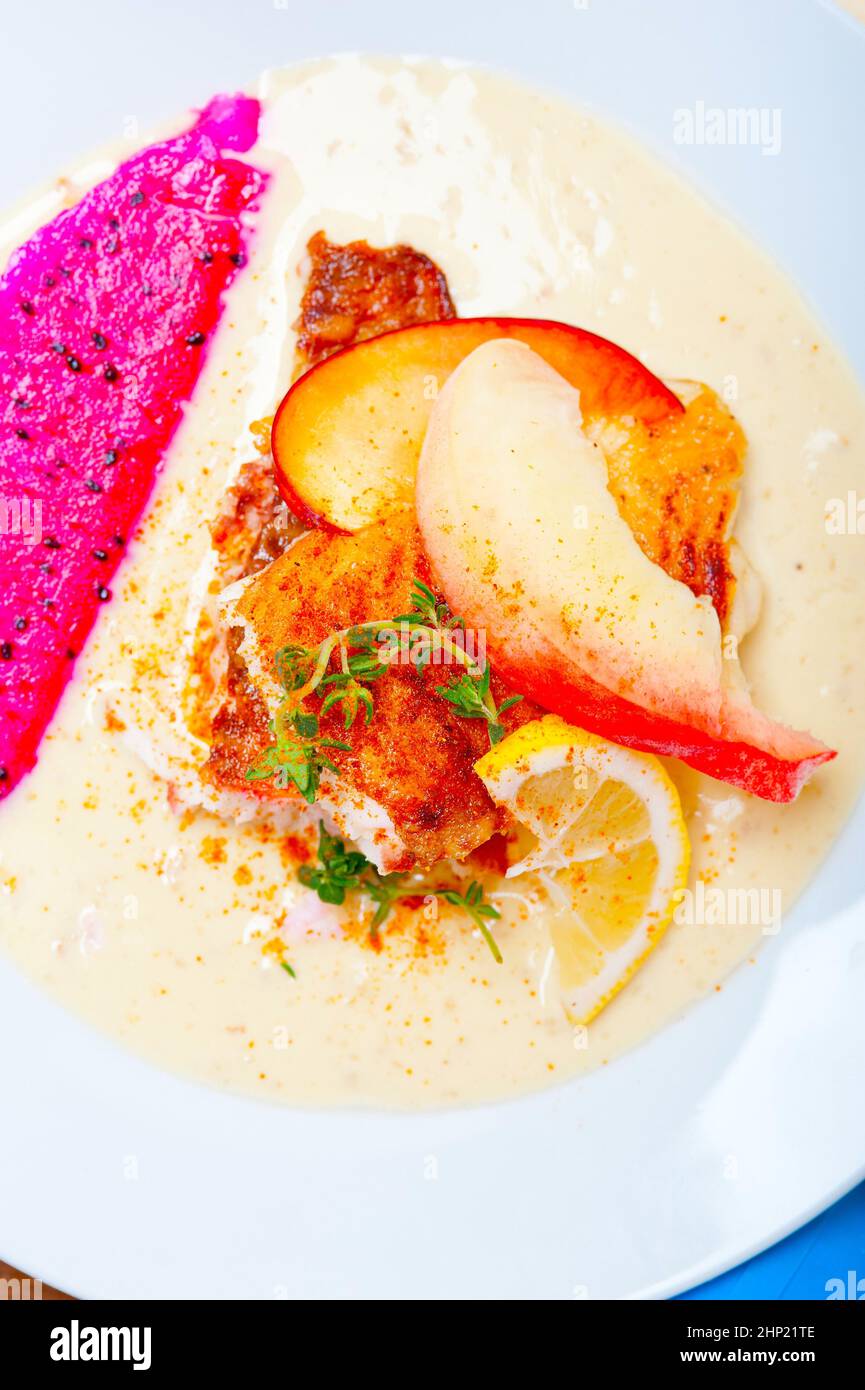 sea bream orata fillet butter pan fried with fresh peach prune and ...