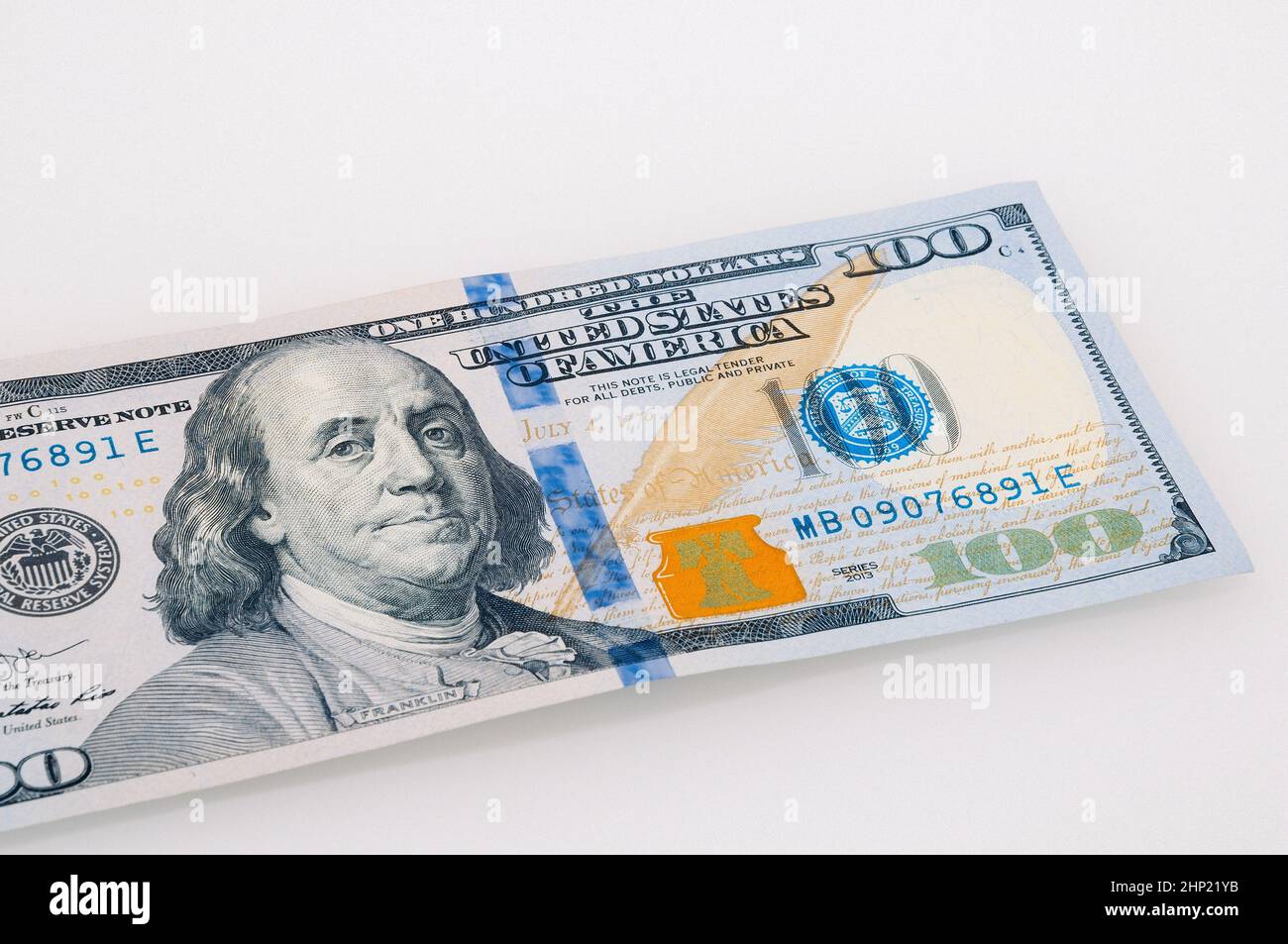 One hundred dollar cash bill on a light background. Layout, mockup ...