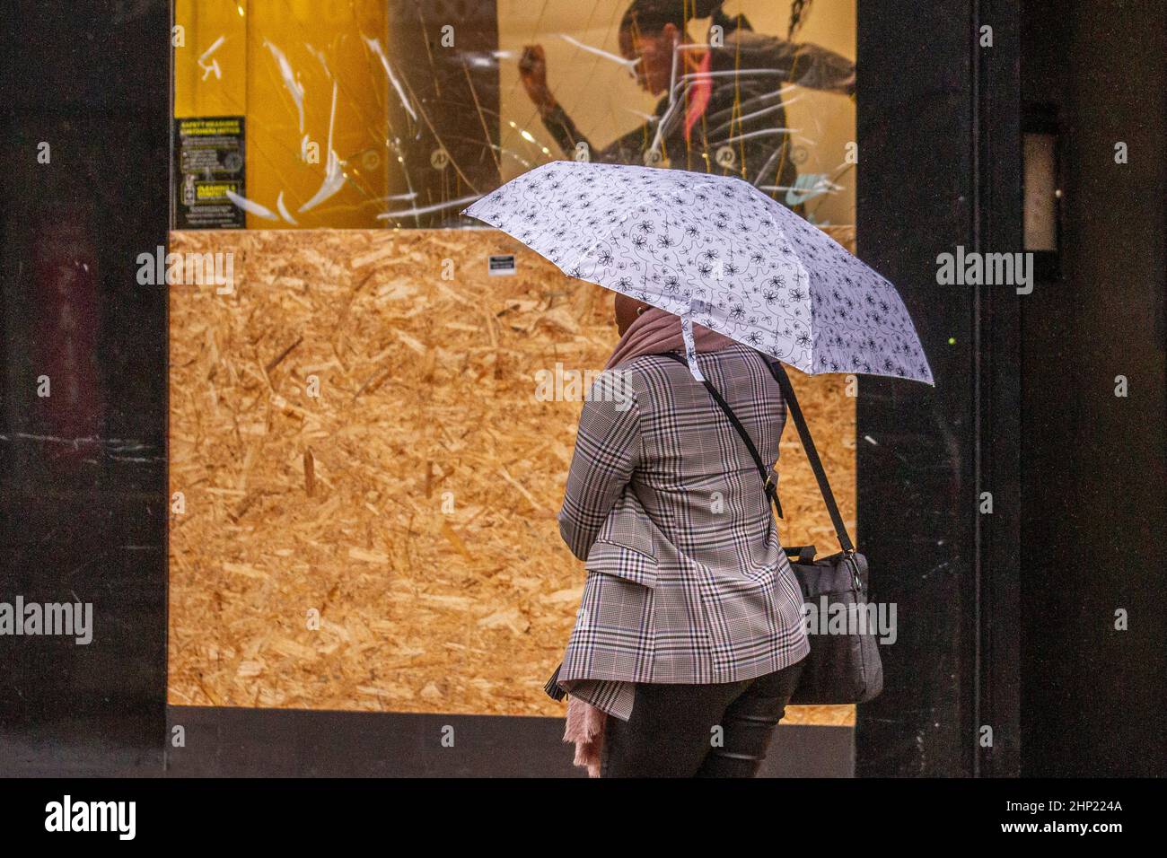 Sticky plastic covering broken glass hi-res stock photography and ...