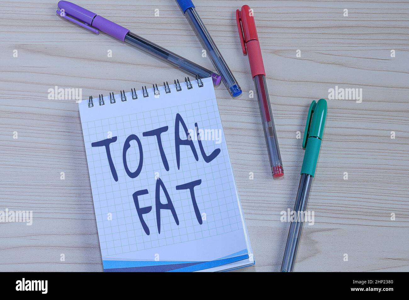 Text sign showing Total Fat, Concept meaning combined value of the ...