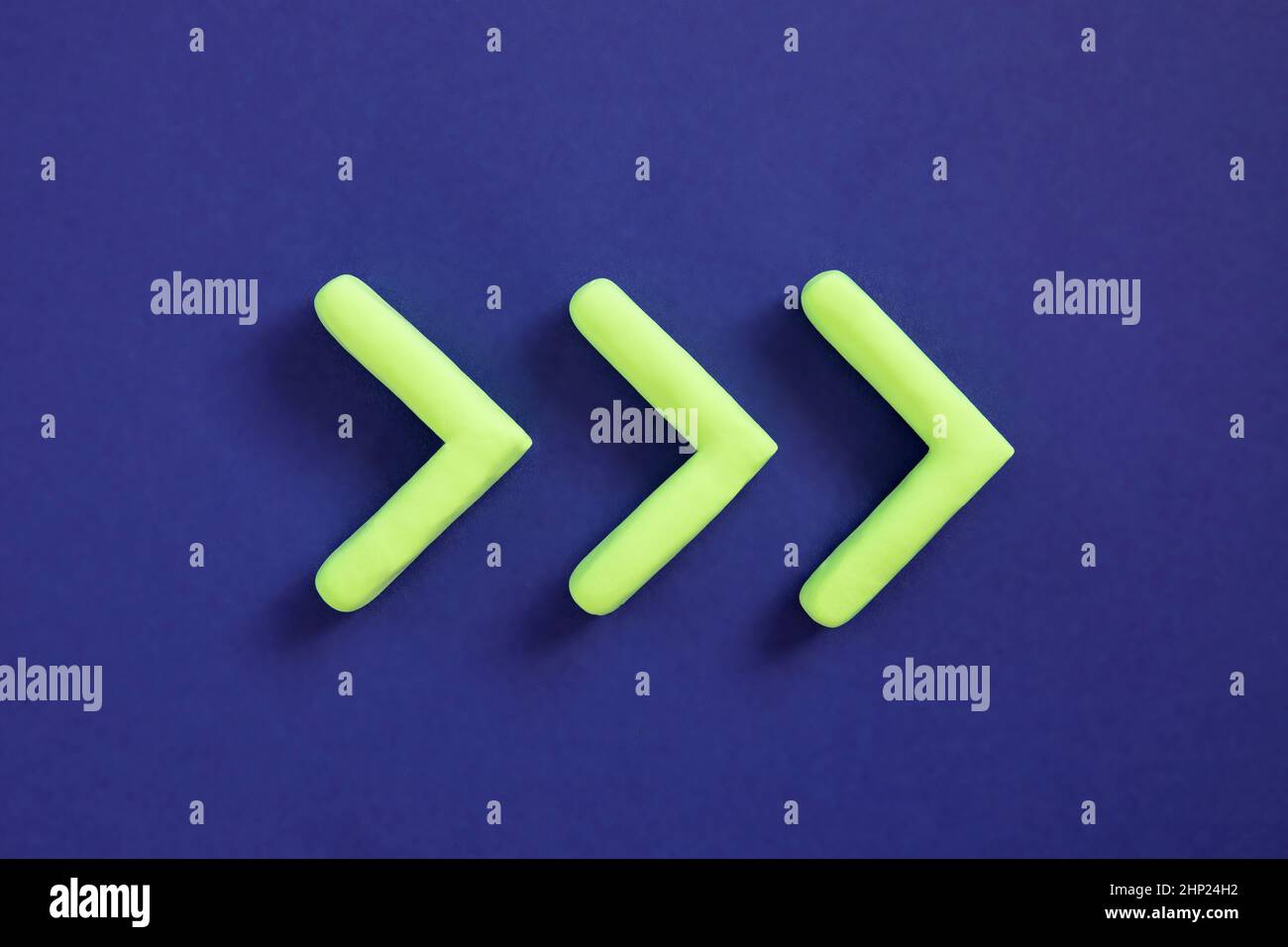 Green arrows pointing right side. Three dimensional arrow sign showing ...