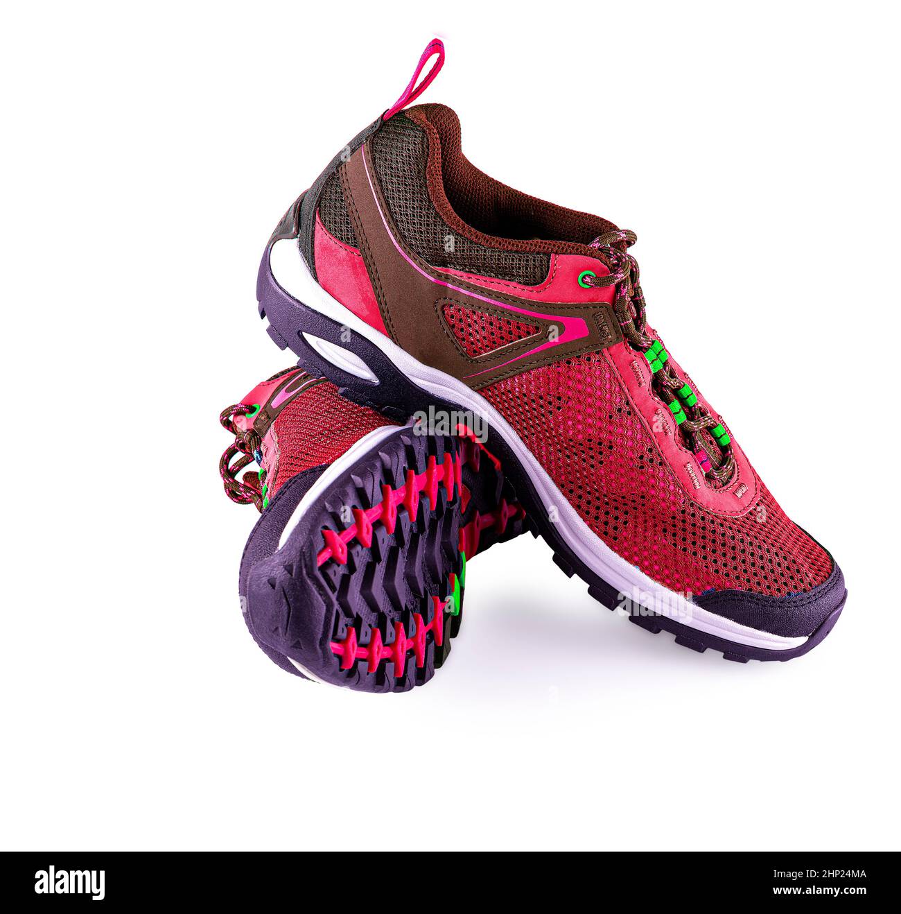 The Pair of red women sneakers isolated on white background Stock Photo ...