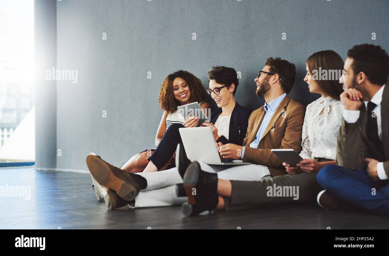 Teamwork makes great work. Studio shot of a group of businesspeople ...