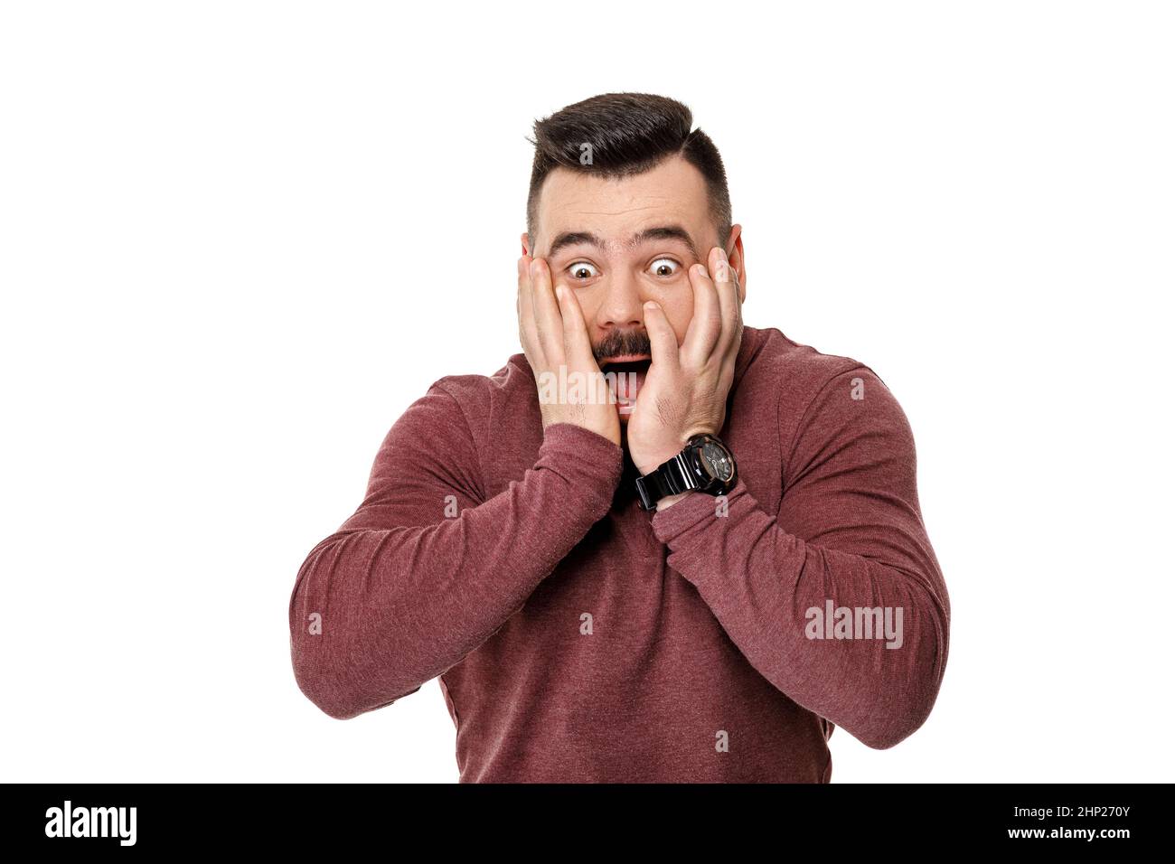 shocked man screaming on white background. man watching sports and ...