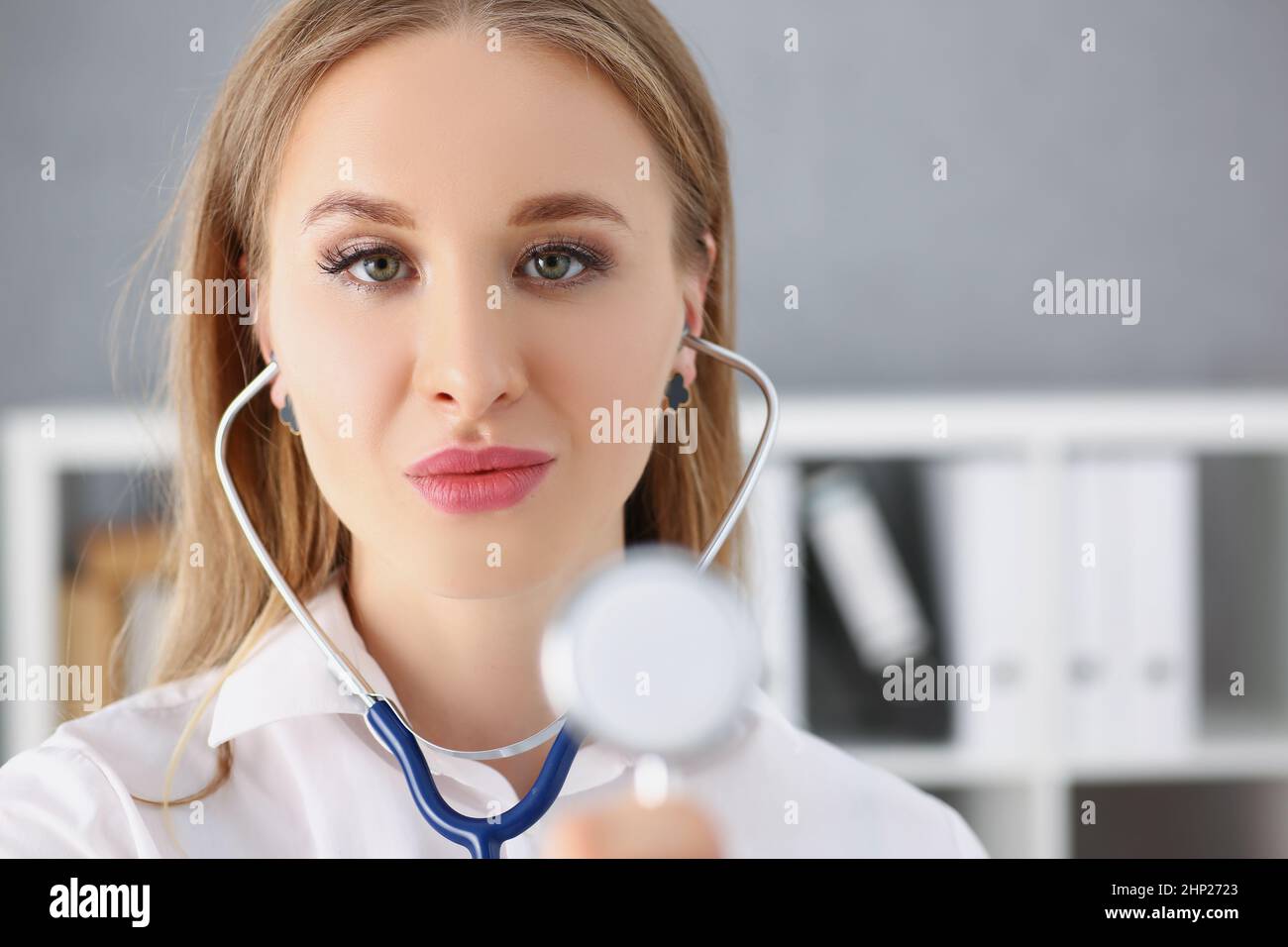 Beautiful young female medical doctor with a stethoscope Stock Photo ...