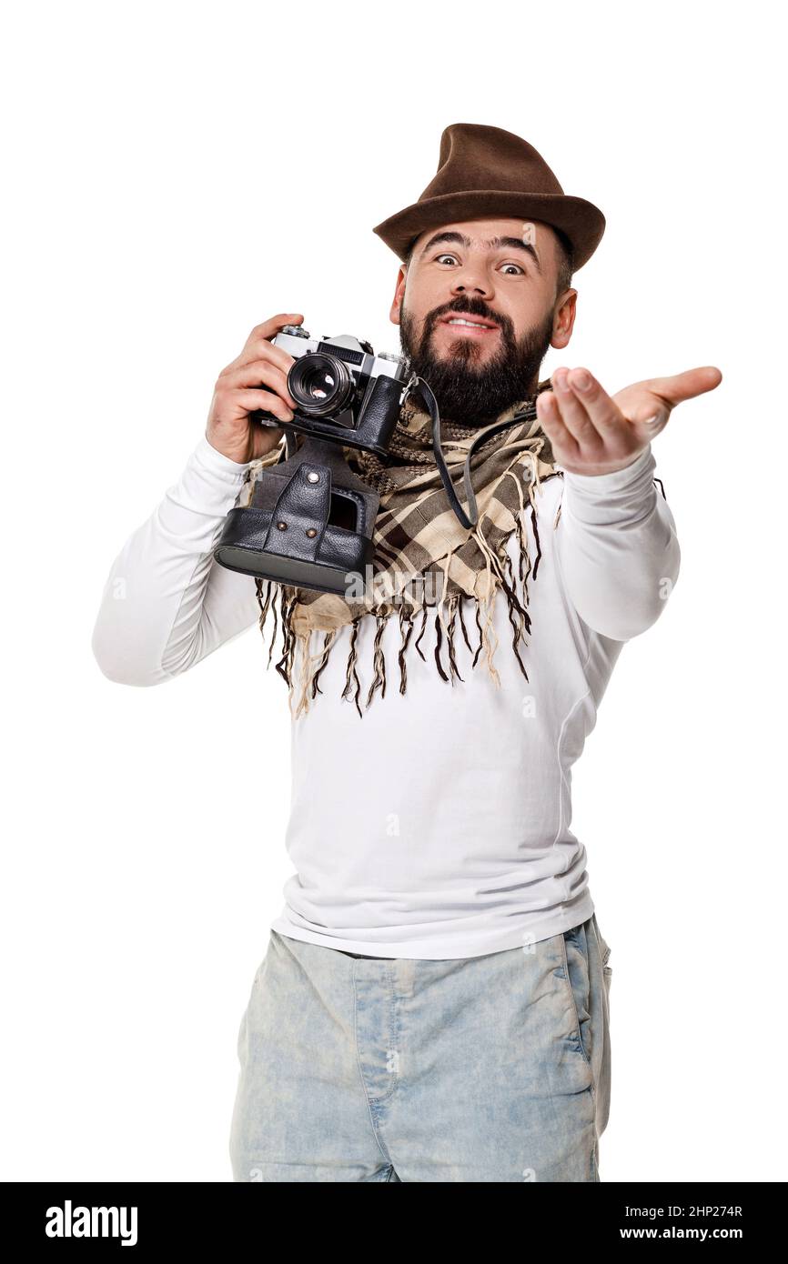 stylish young male photographer with retro camera on white background ...