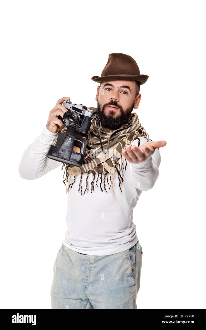 stylish young male photographer with retro camera on white background ...