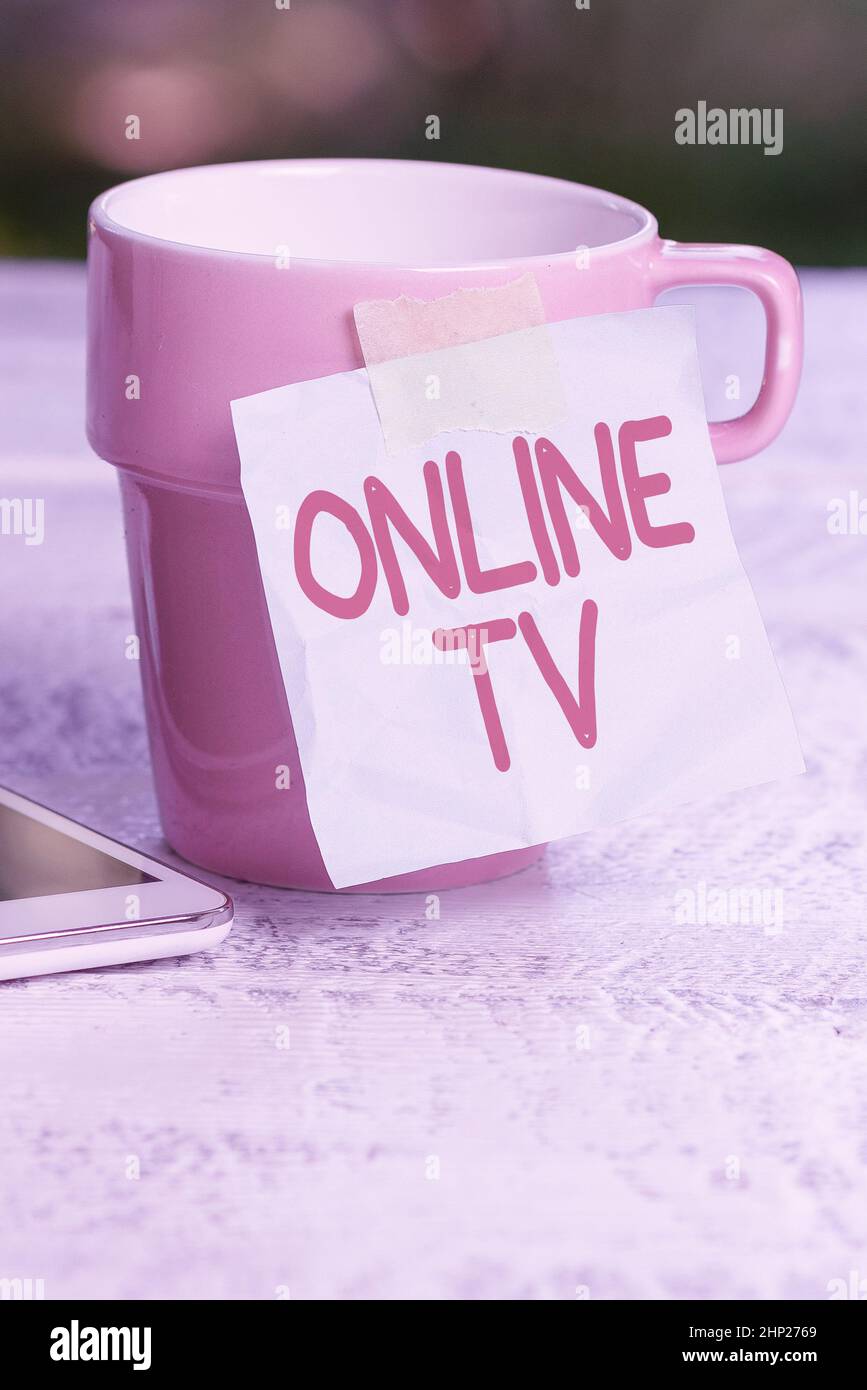 Sign displaying Online Tv, Word Written on a television production ...