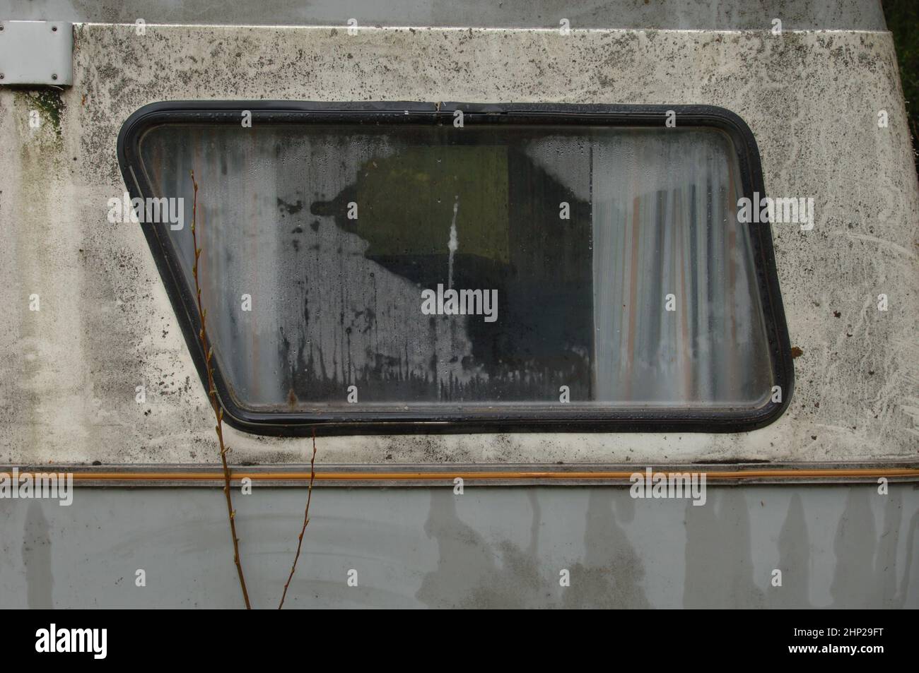 Window on side of caravan Stock Photo - Alamy