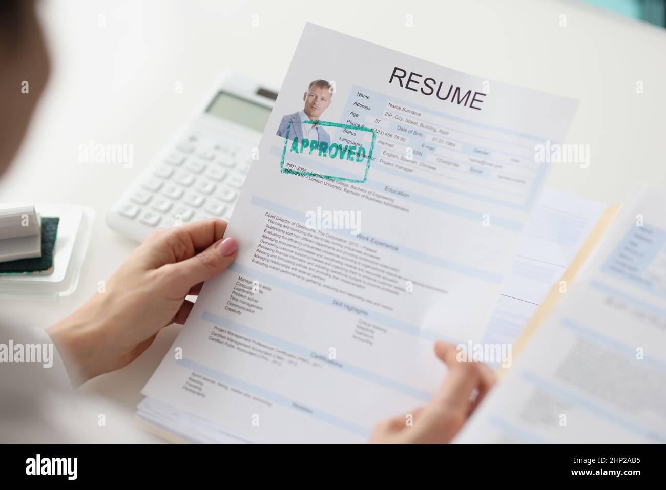 Woman hands holding resume hi-res stock photography and images - Alamy