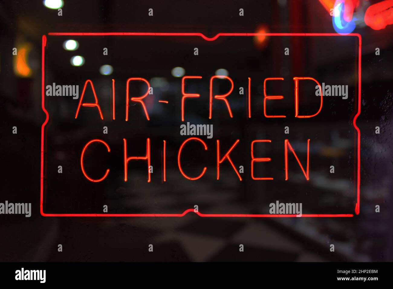 Vintage Style Neon Air Fried Chicken Sign in Rainy Window Stock Photo ...