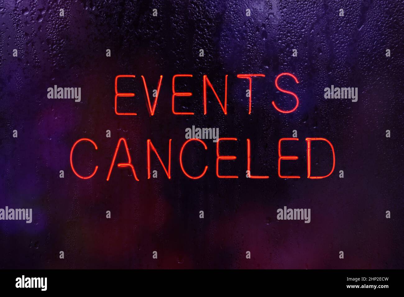 Vintage Neon Events Canceled Sign in Rainy Window Stock Photo - Alamy