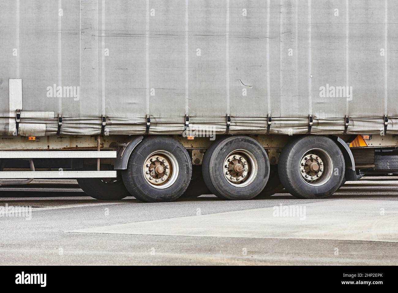 Parking trucks wheels close up Stock Photo - Alamy