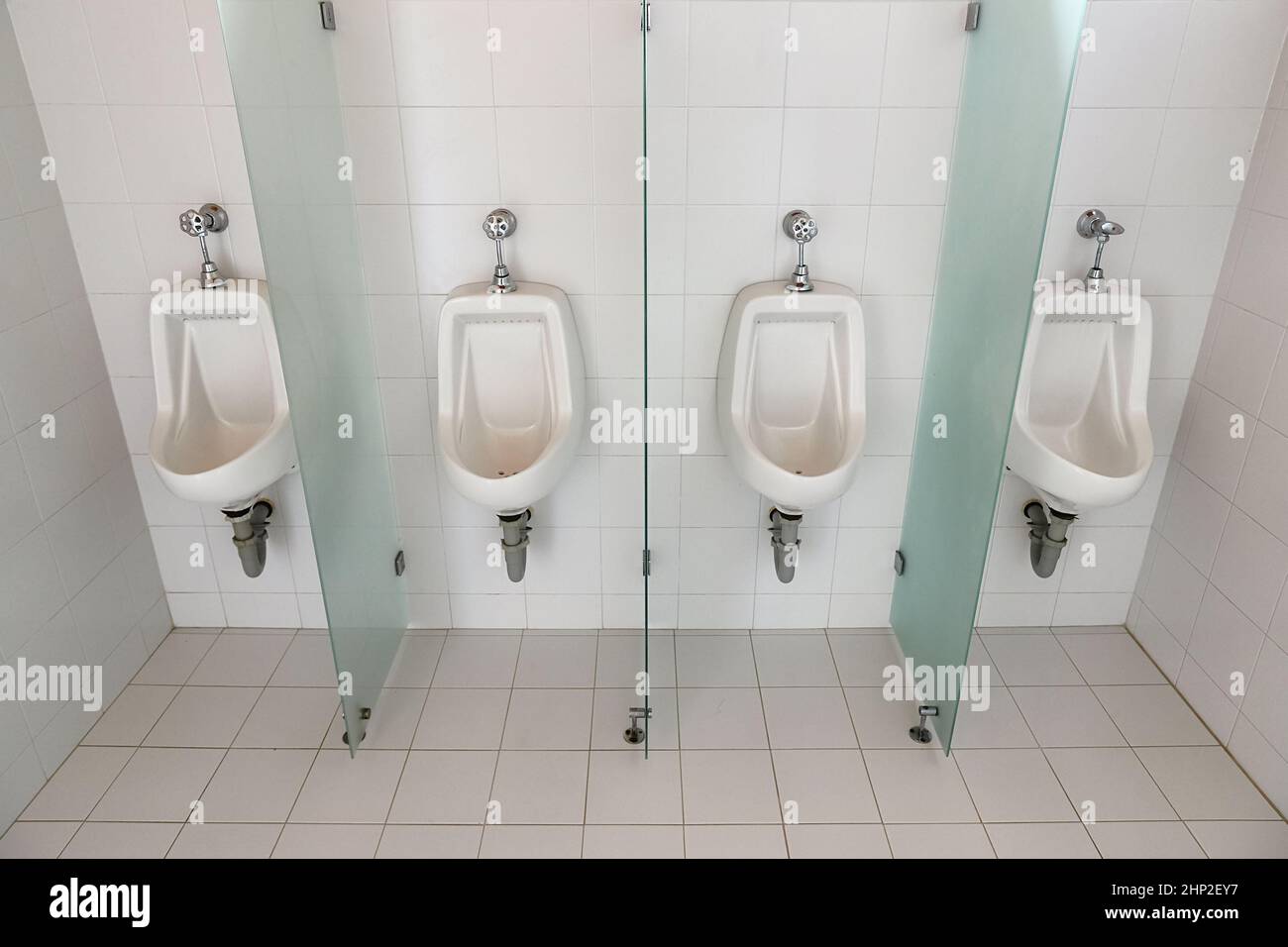Two urinals in a public toilet Stock Photo - Alamy