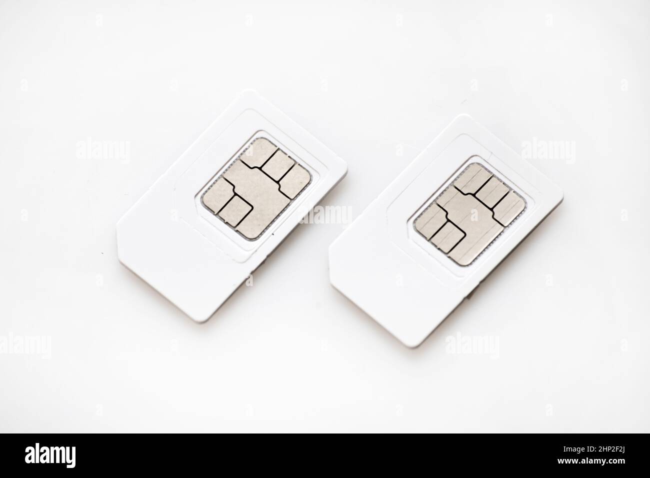 sim phone cards isolated on white background Stock Photo - Alamy