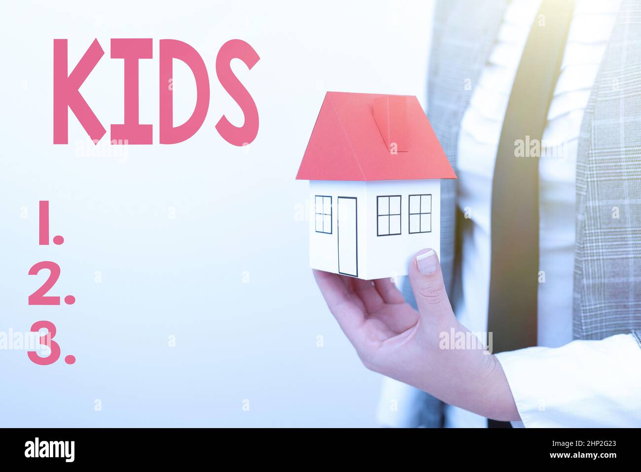 Hand writing sign Kids, Word Written on a young human being below the ...