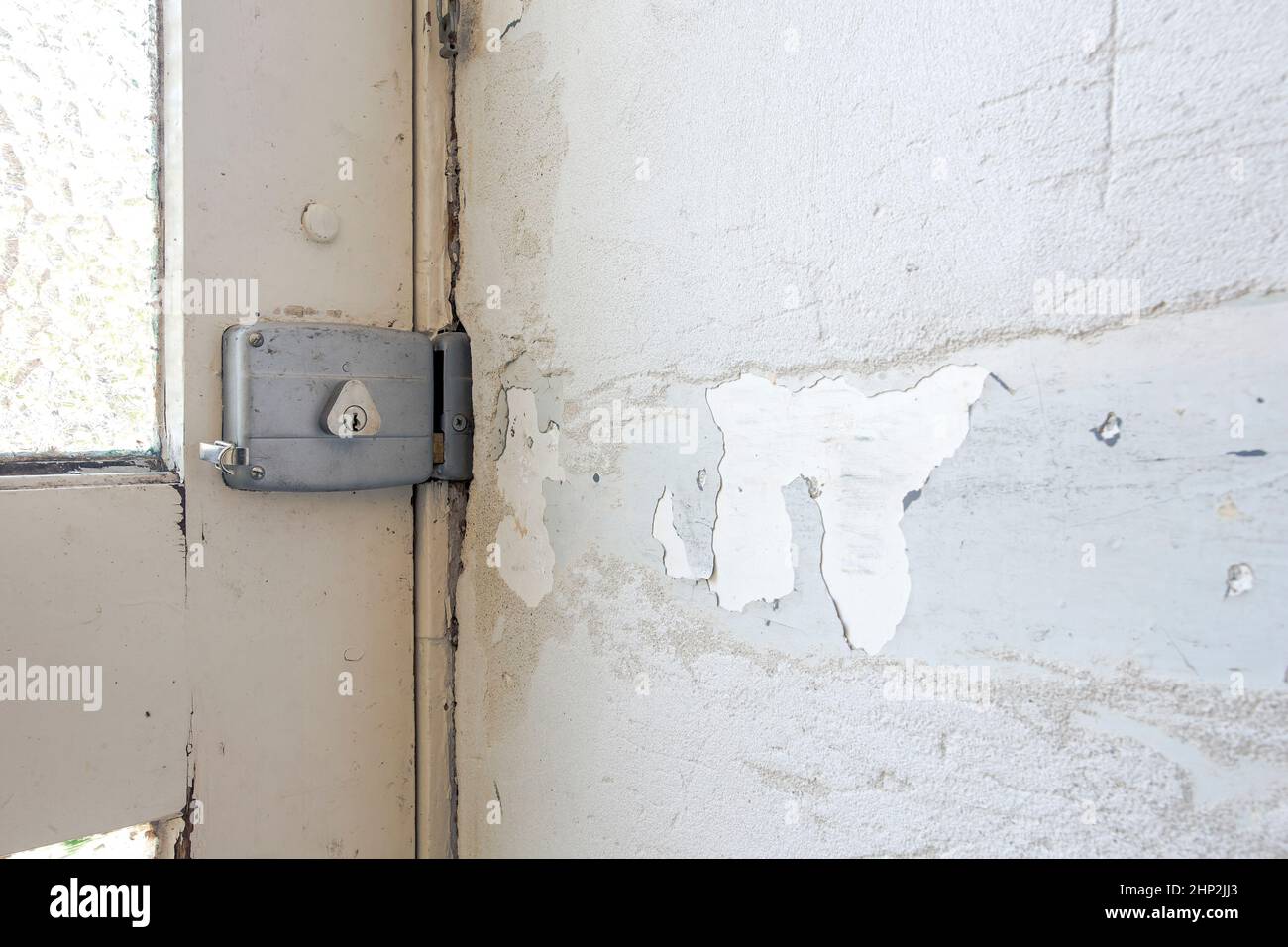 Wooden door in house that needs renovation, front door close-up ...