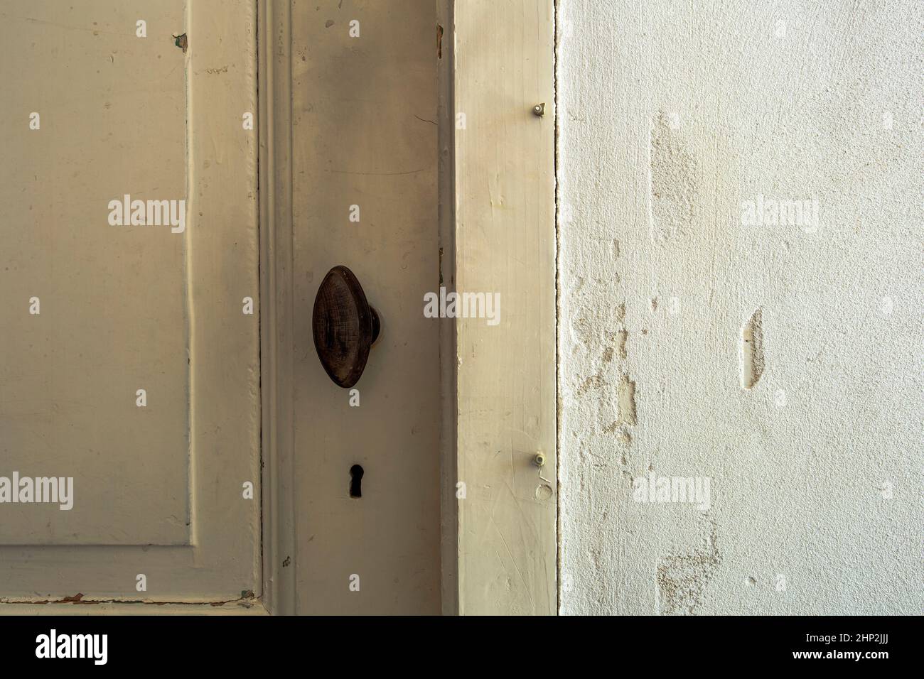 Wooden door in house that needs renovation, front door close-up ...