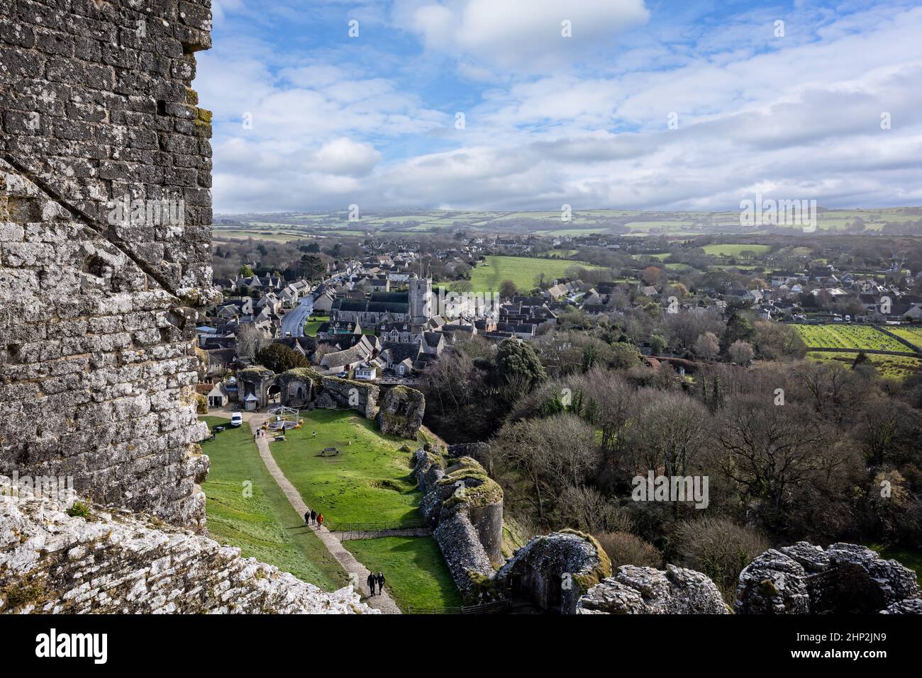 View of Corfe village and church from Corfe Castle in Corfe, Dorset, UK ...