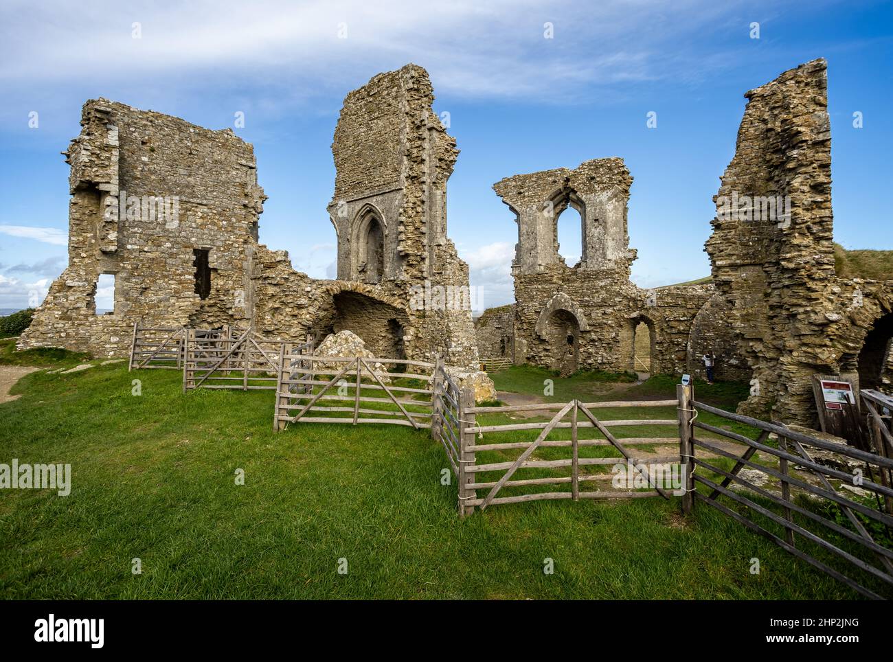 Close up of group of ruined walls and windows of Corfe Castle seen from ...