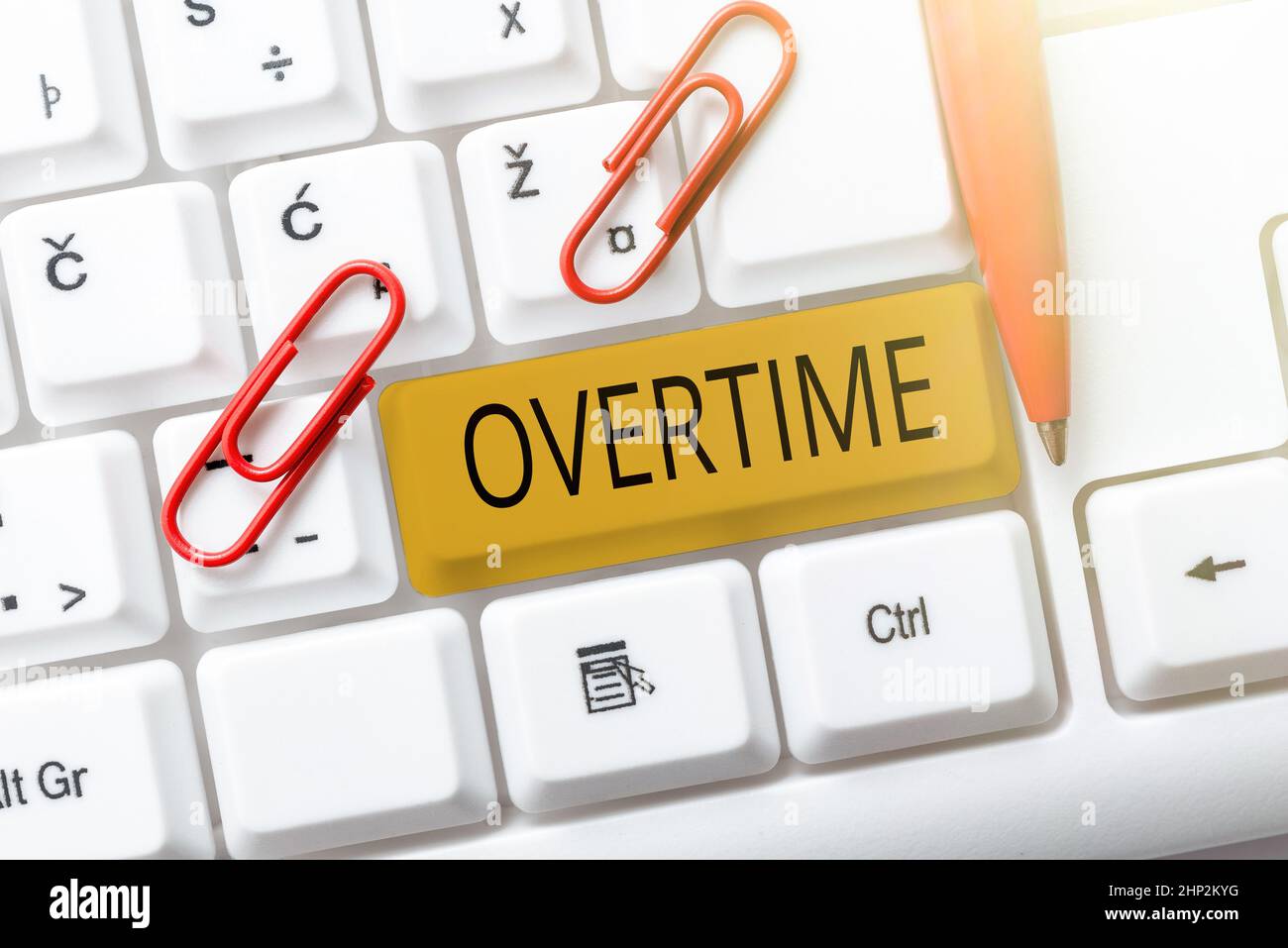 Hand writing sign Overtime, Word Written on Time or hours worked in ...