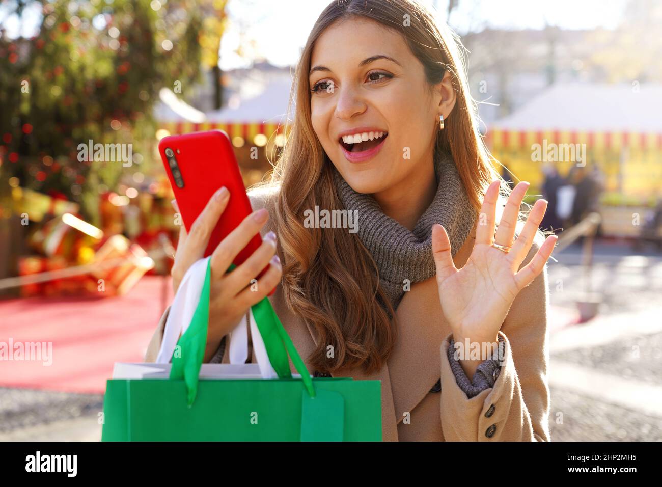 Animated girl say hello in video calling with telephone carrying ...