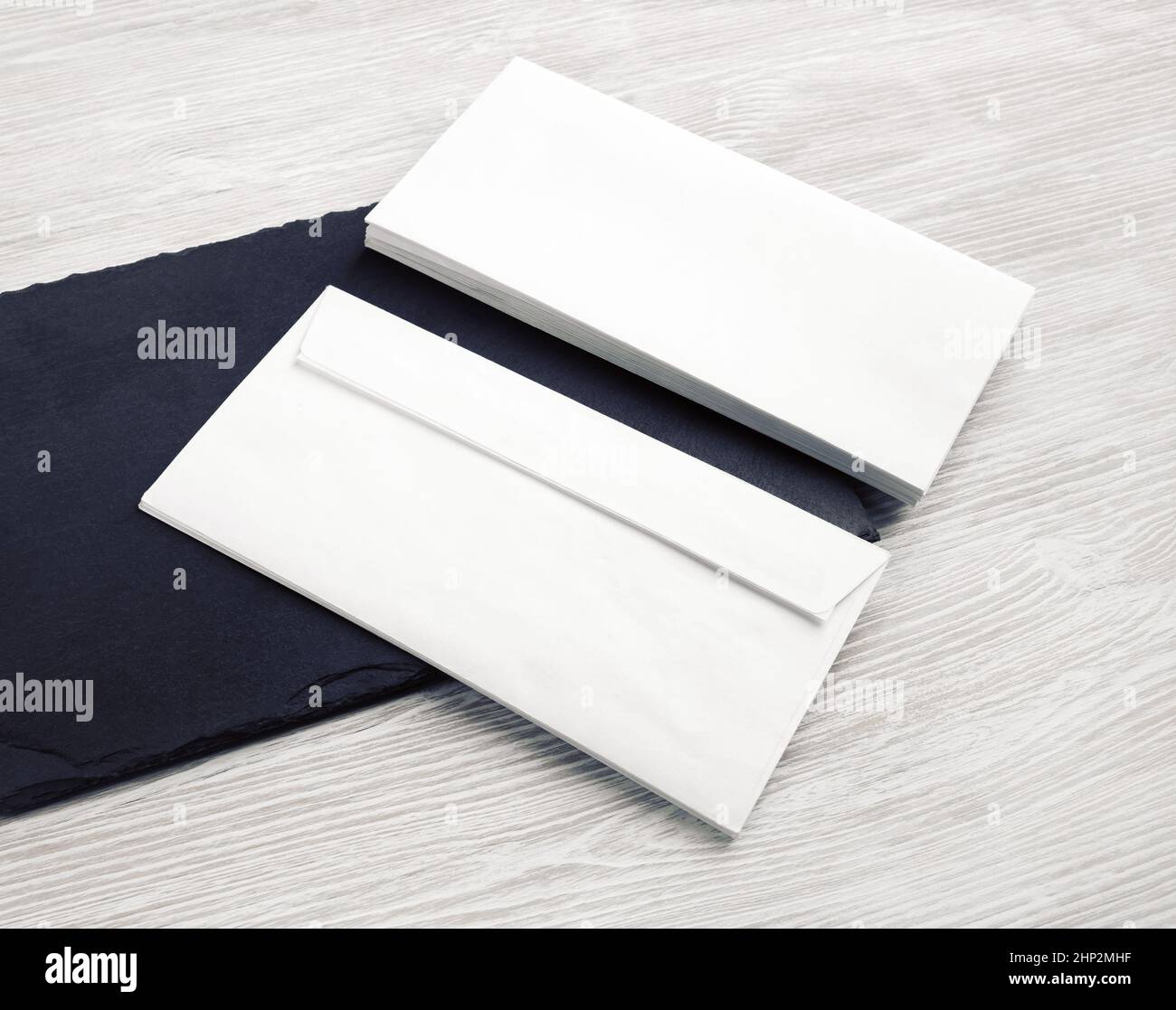 Photo of two blank white envelopes. Front and back side. Template for ...