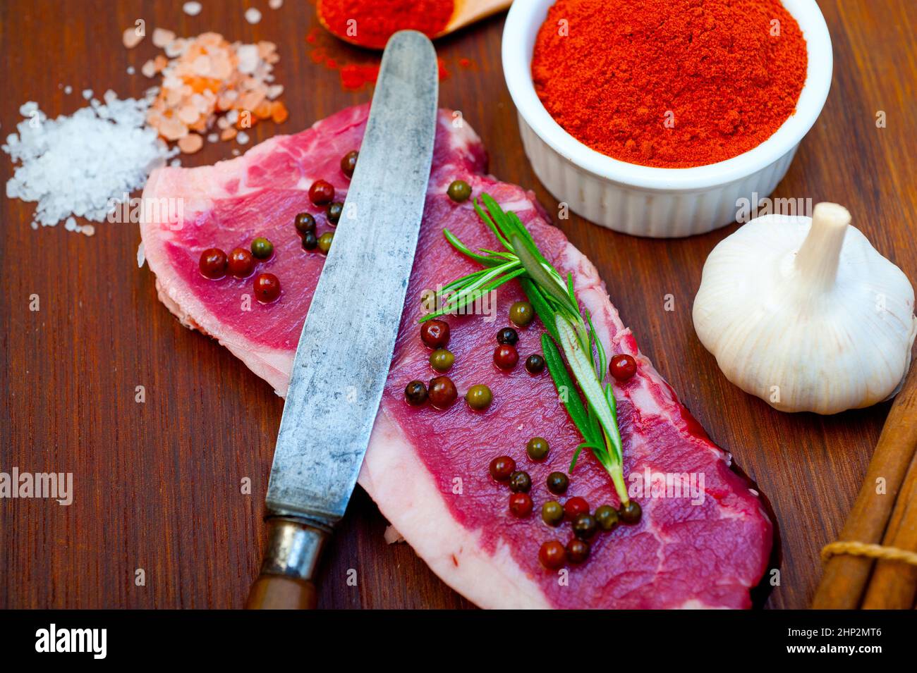raw uncooked ribeye beef steak butcher selection Stock Photo - Alamy