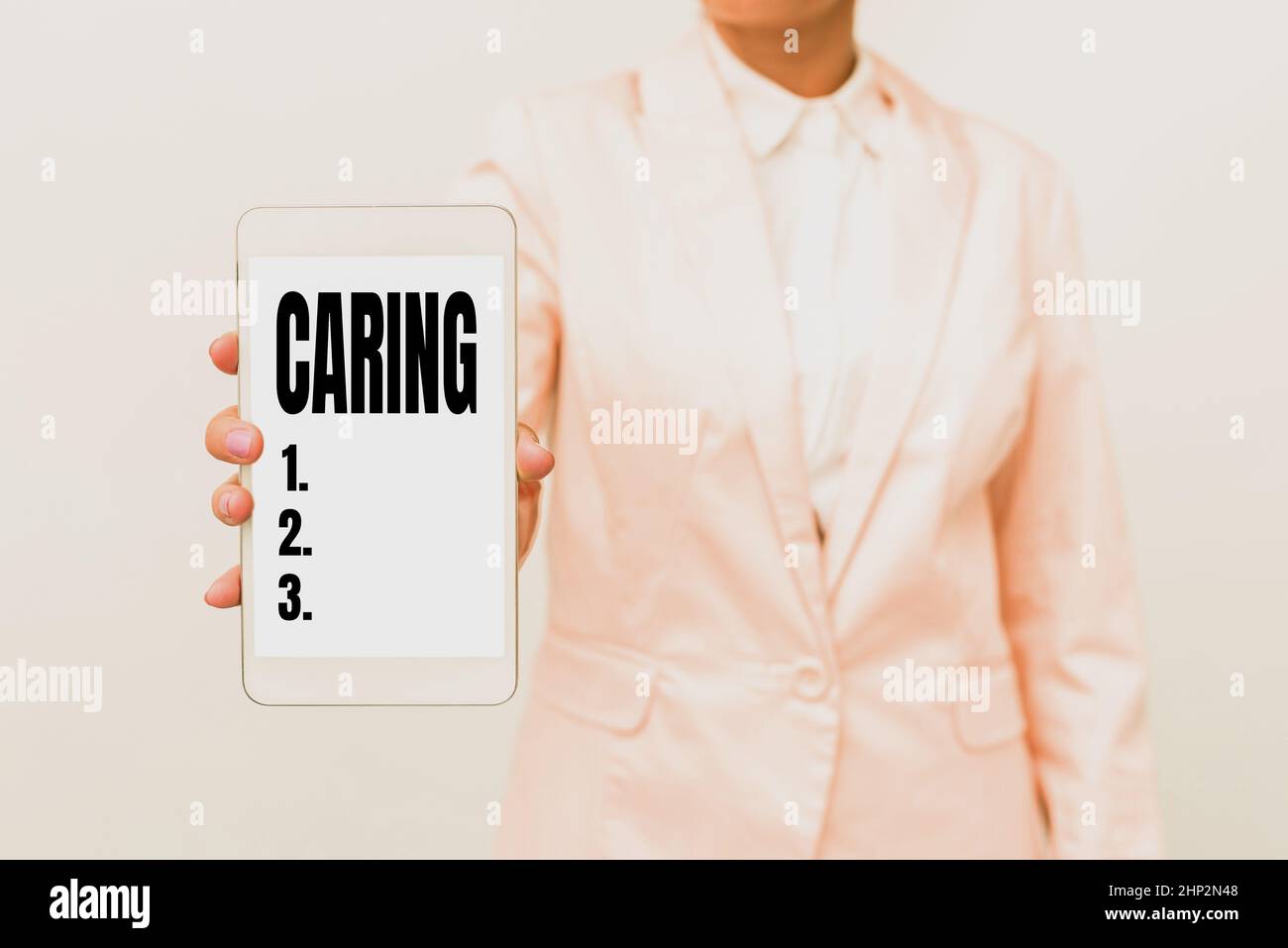 Text showing inspiration Caring, Word Written on practice of looking ...