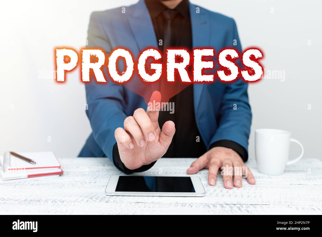 Sign displaying Progress, Word for development towards an improved or ...