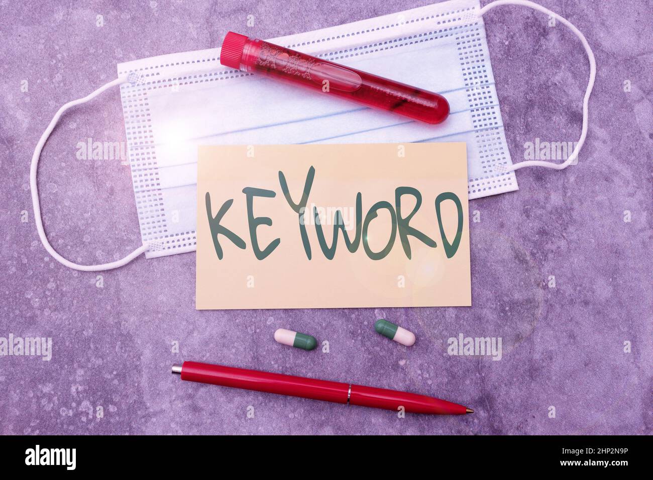 Hand writing sign Keyword, Business showcase word which acts as the key ...