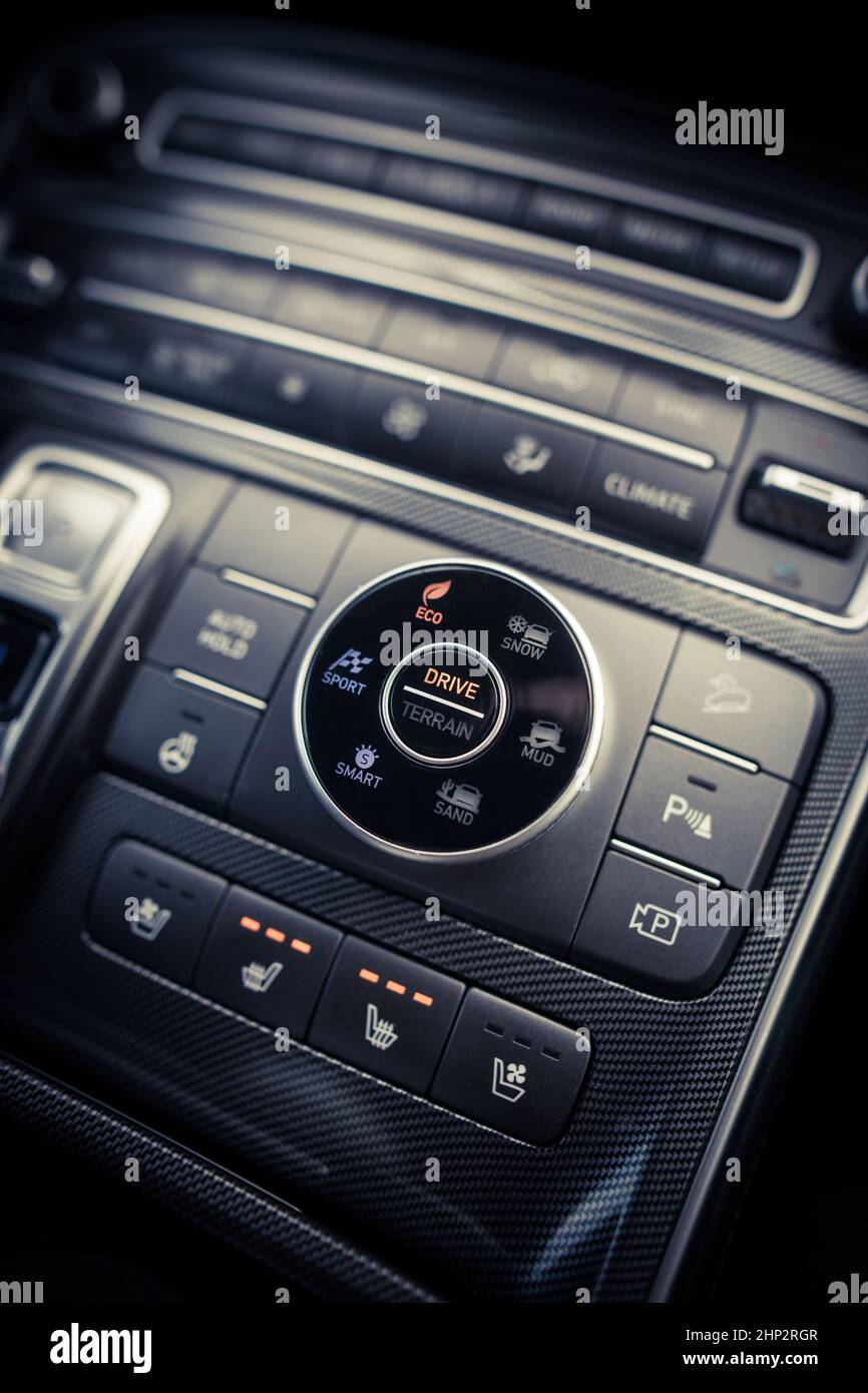 Close up shot of a modern car drive mode selector button, on the ...