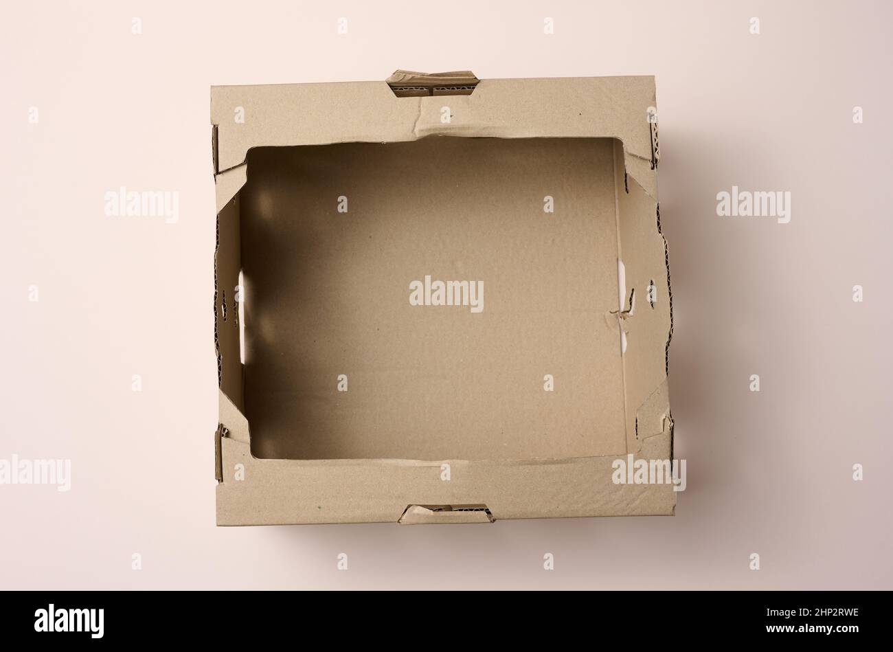 empty open box of brown cardboard, top view, concept of packing things ...