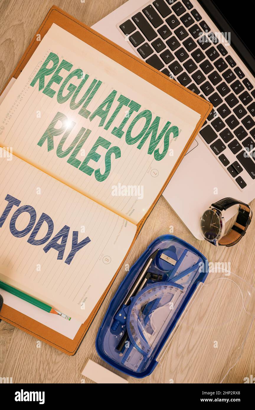 Hand writing sign Regulations Rules, Business idea Standard Statement ...