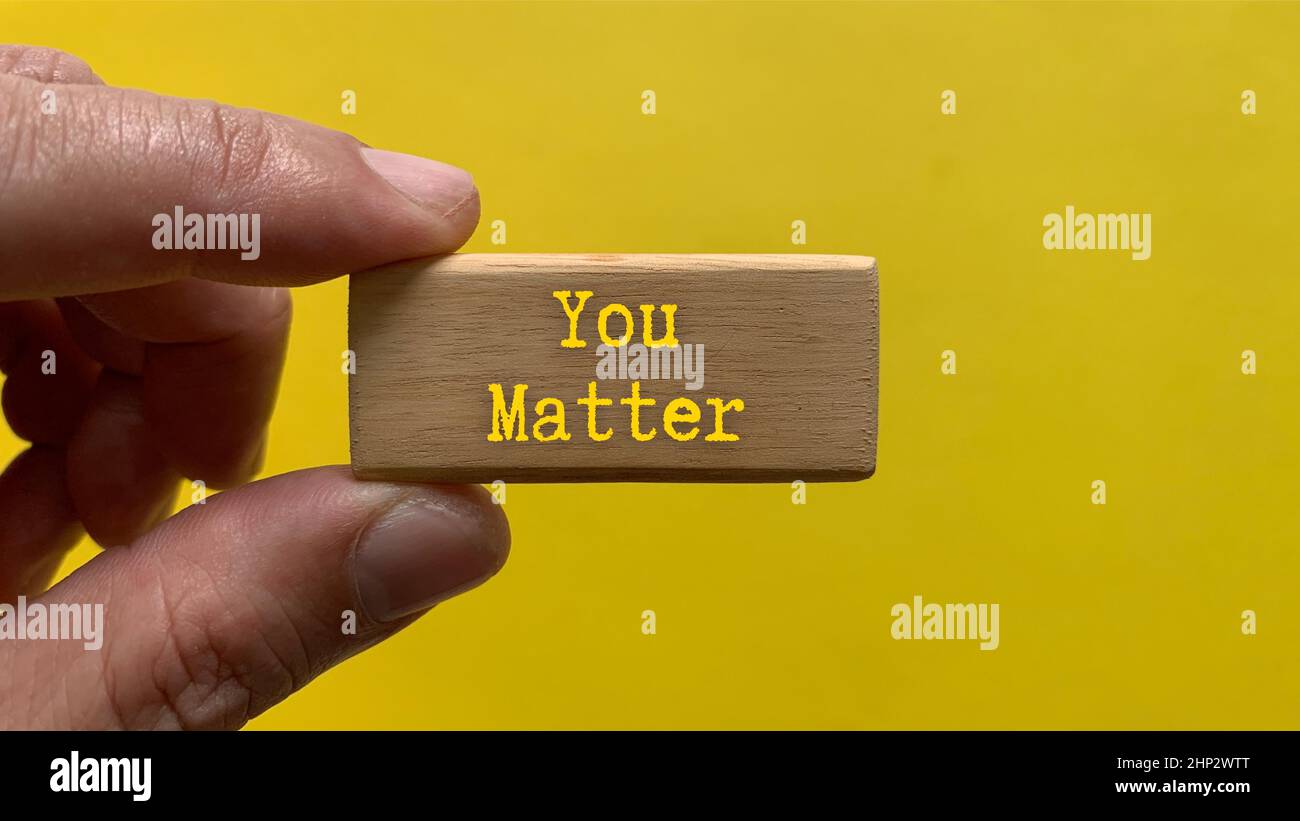 Wooden block with the words You matter. Motivational concept Stock ...