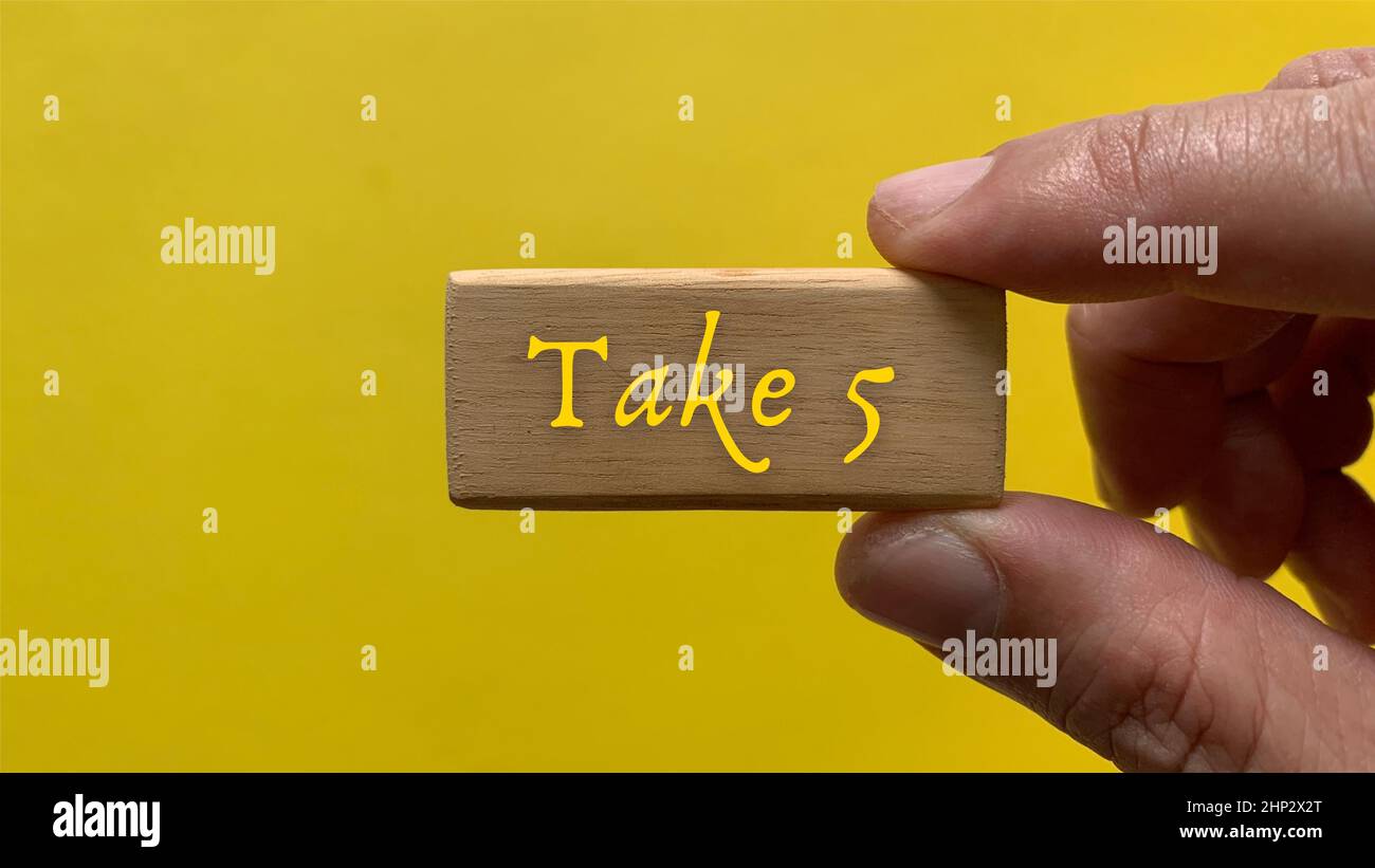 Wooden block with the words Take 5. Business concept Stock Photo - Alamy