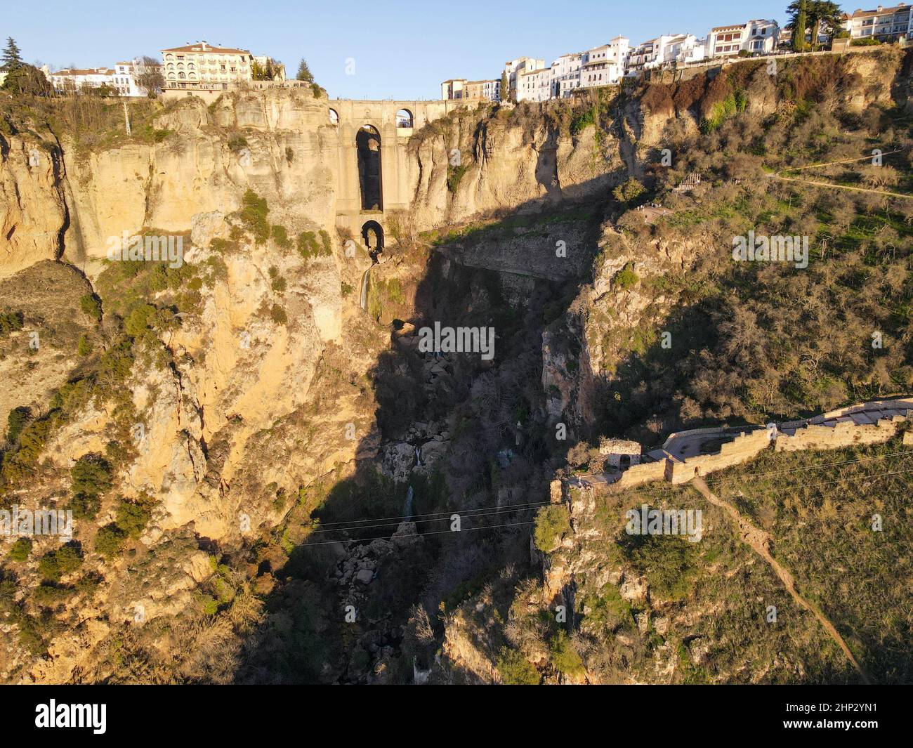 Drone view at the old bridge of Ronda on Andalusia in Spain Stock Photo ...