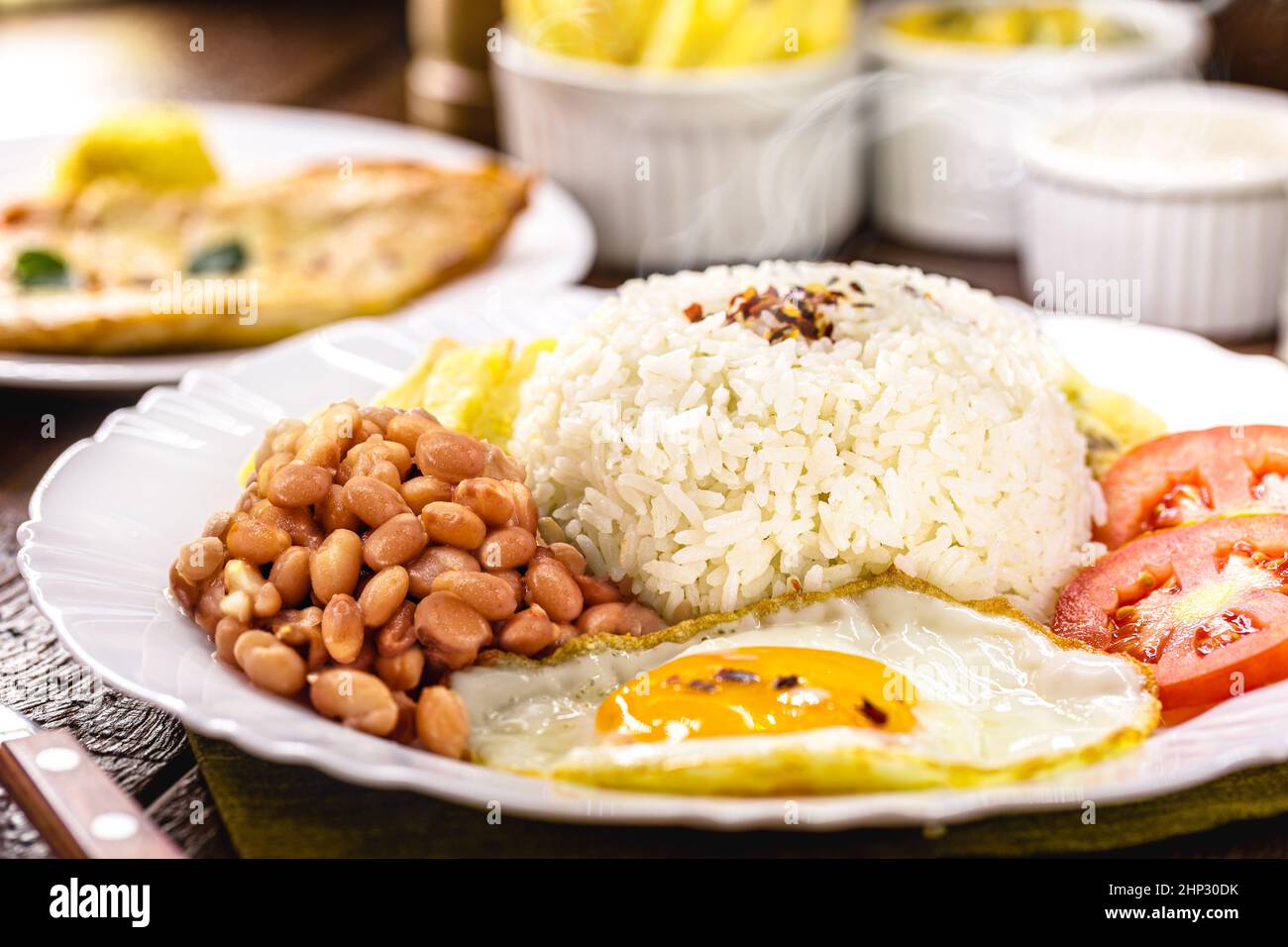 rice and beans typical of brazil, healthy and light food, fried egg and ...