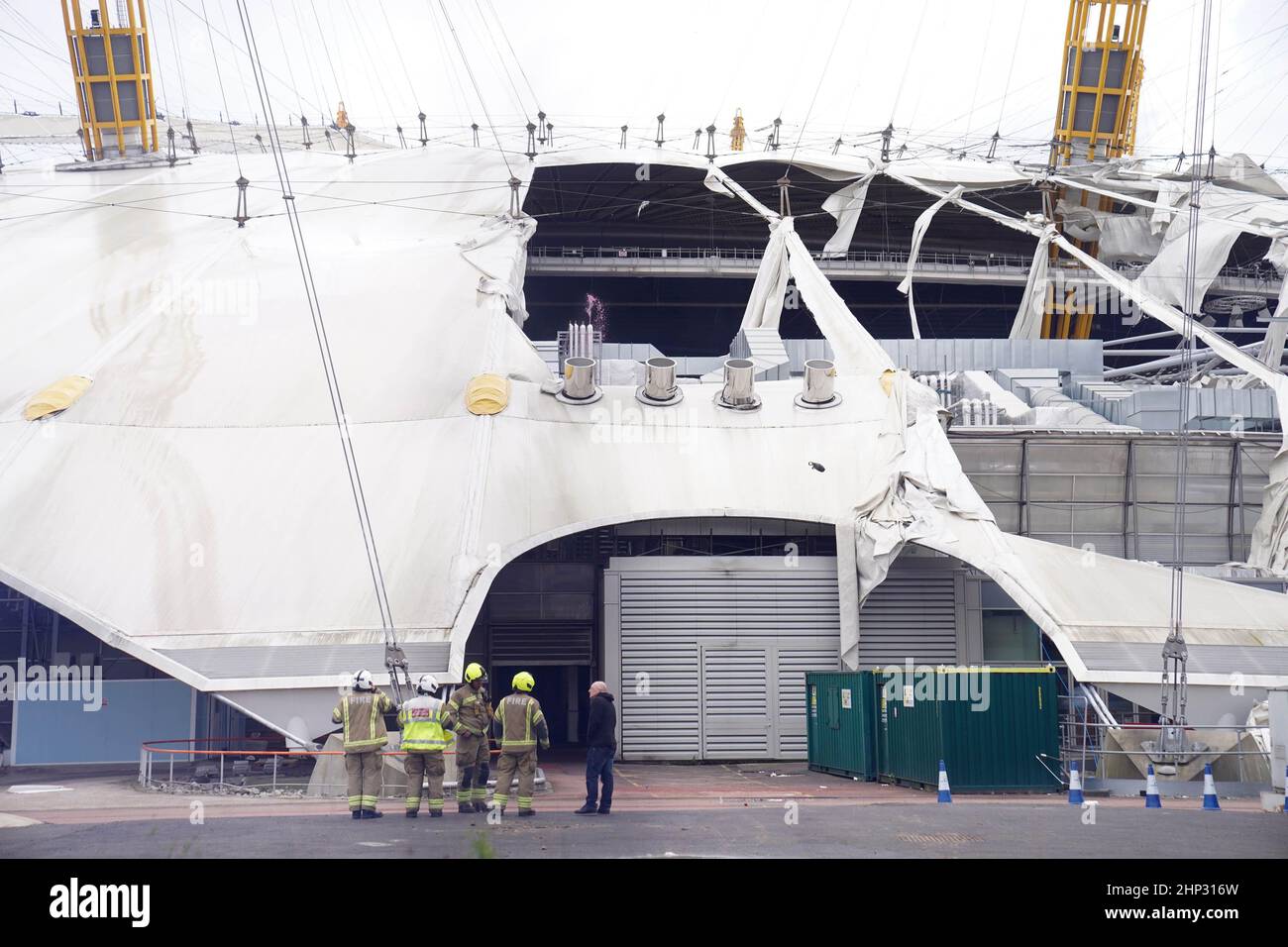 Emergency services look at the damage to the roof of the O2 Arena ...